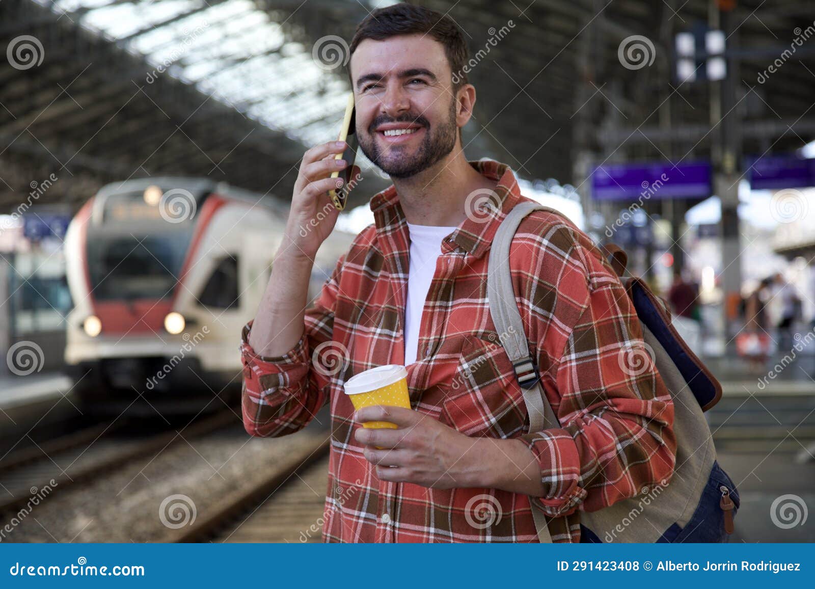 Handsome Man Making a Call from a Train Station Stock Photo - Image of ...
