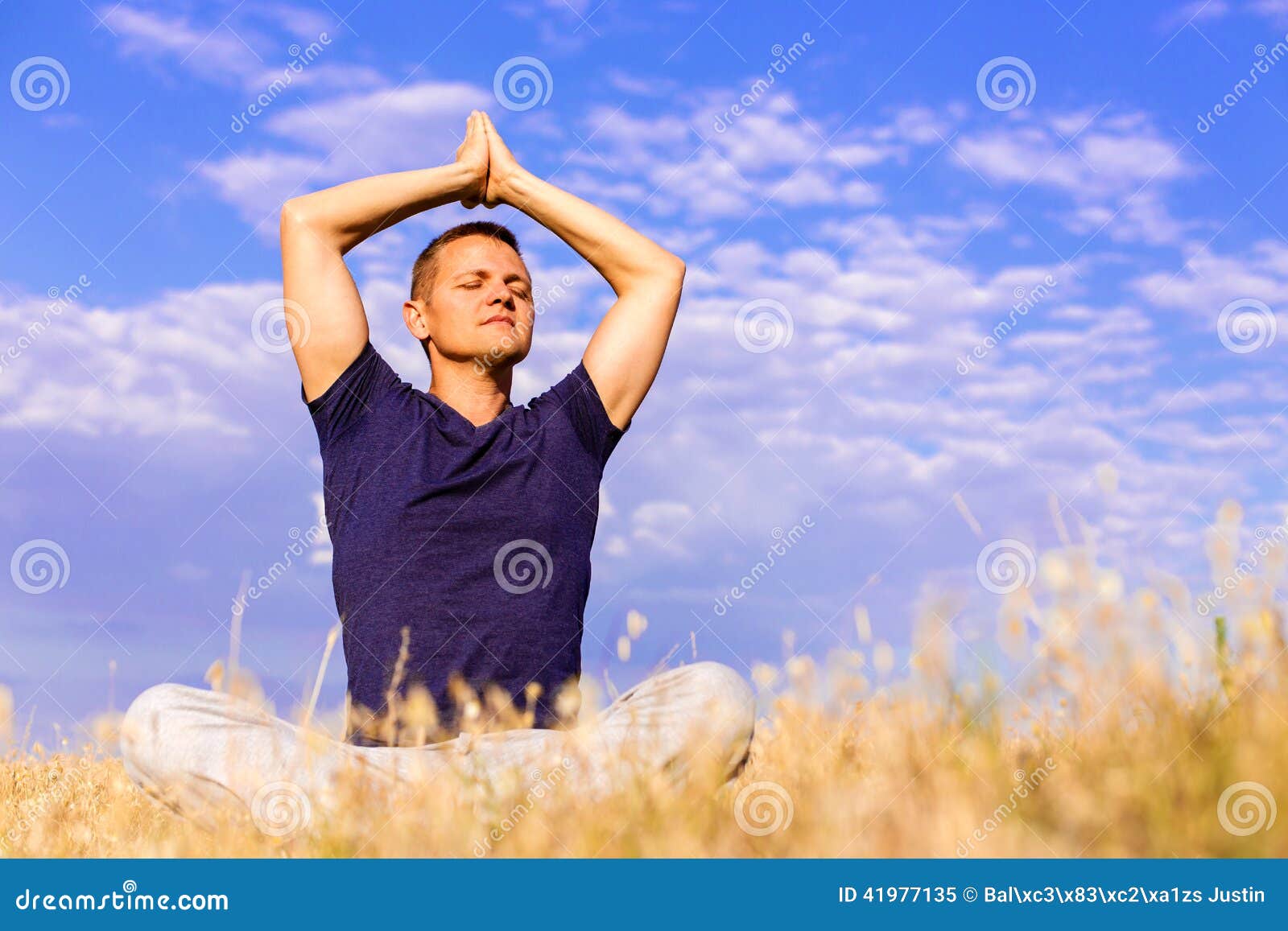 Handsome Man Meditating on the Field. Stock Image - Image of freedom ...