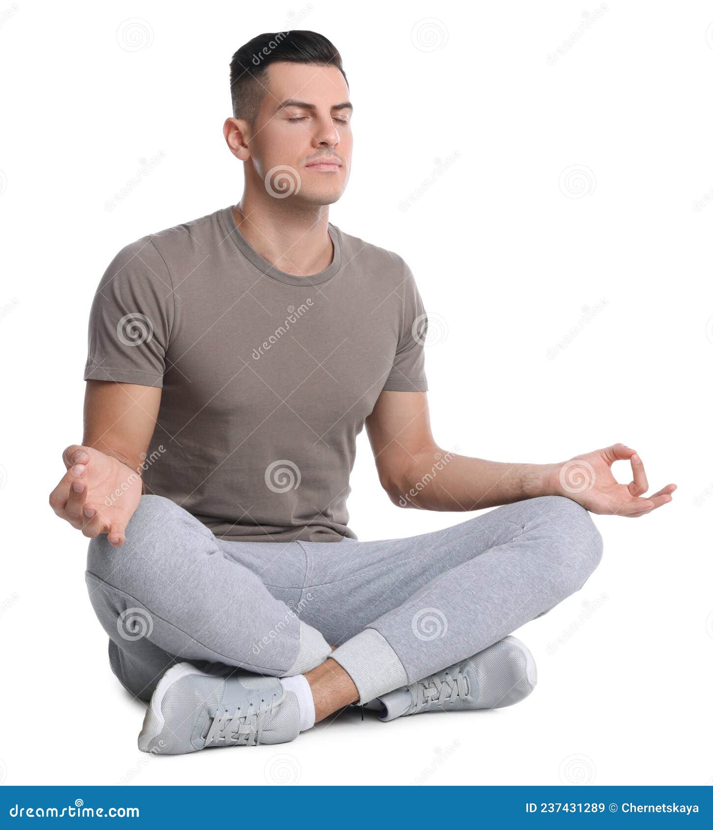 Handsome Man Meditating on White Background. Harmony and Zen Stock ...