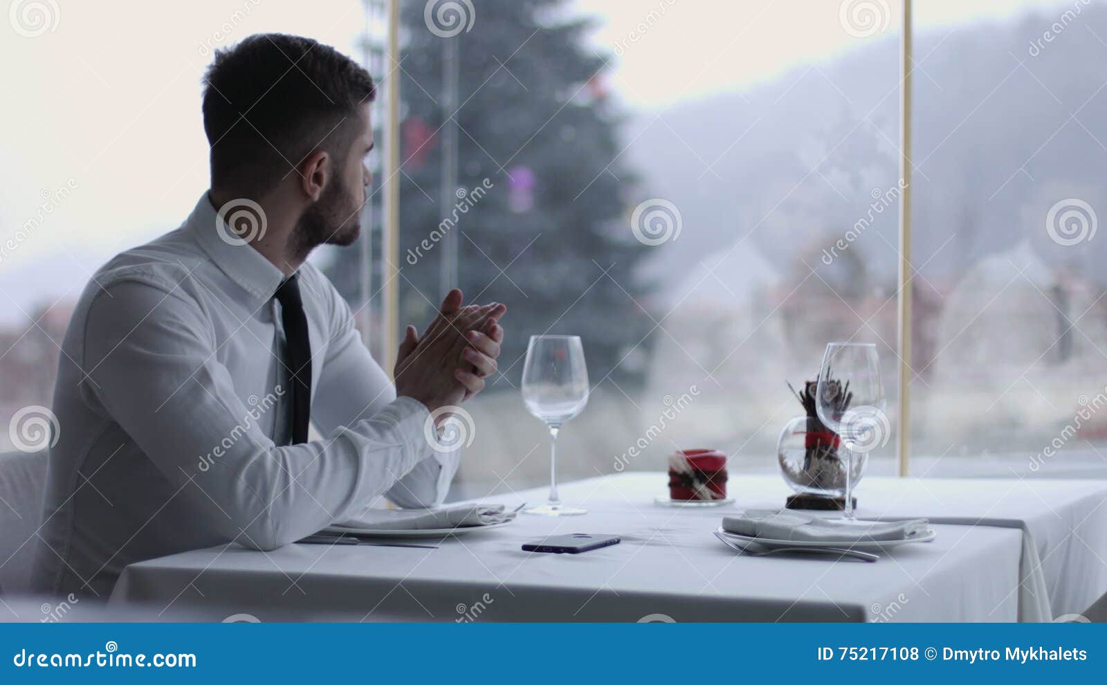 Handsome Man with Mobile Phone in Restaurant Stock Photo - Image of ...