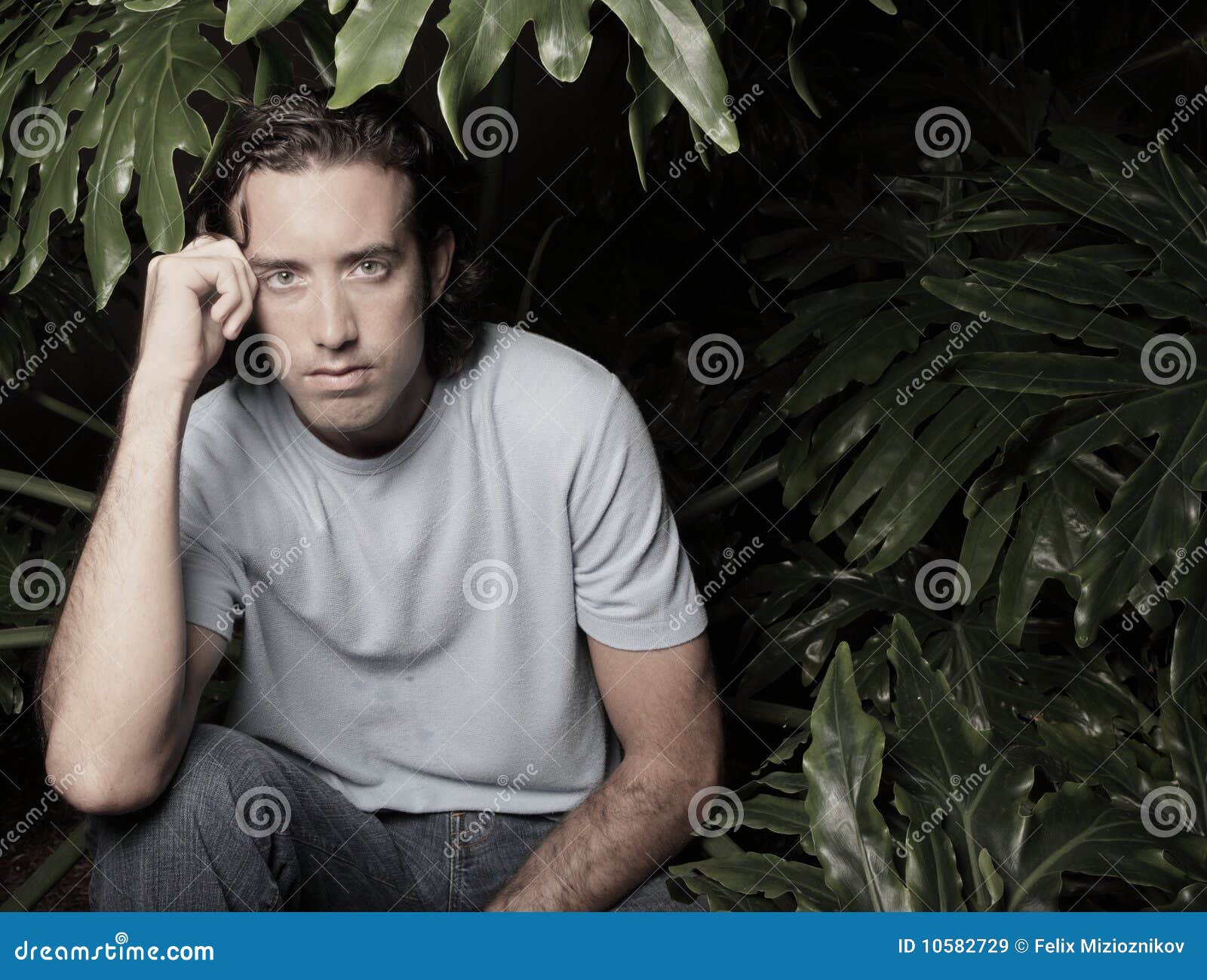 Handsome man in nature stock image. Image of pondering - 10582729