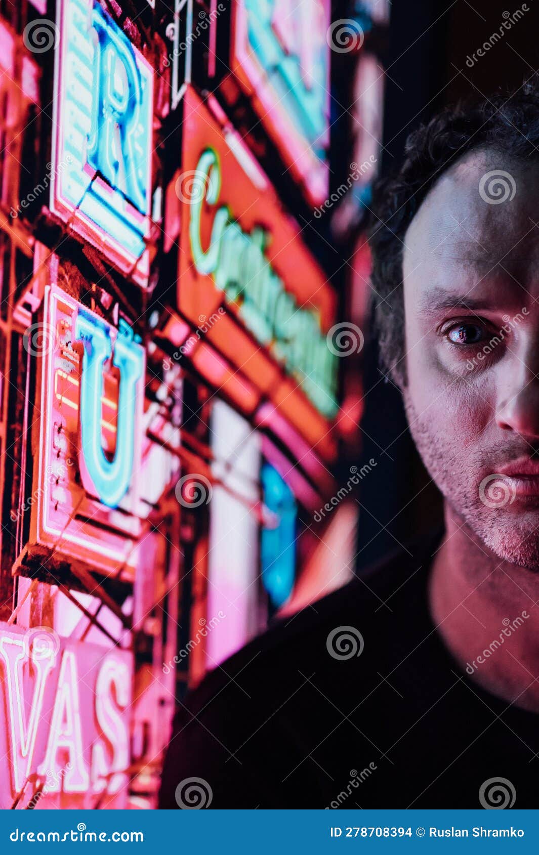 A Handsome Man Next To Bright LED Lights Stock Photo - Image of color ...