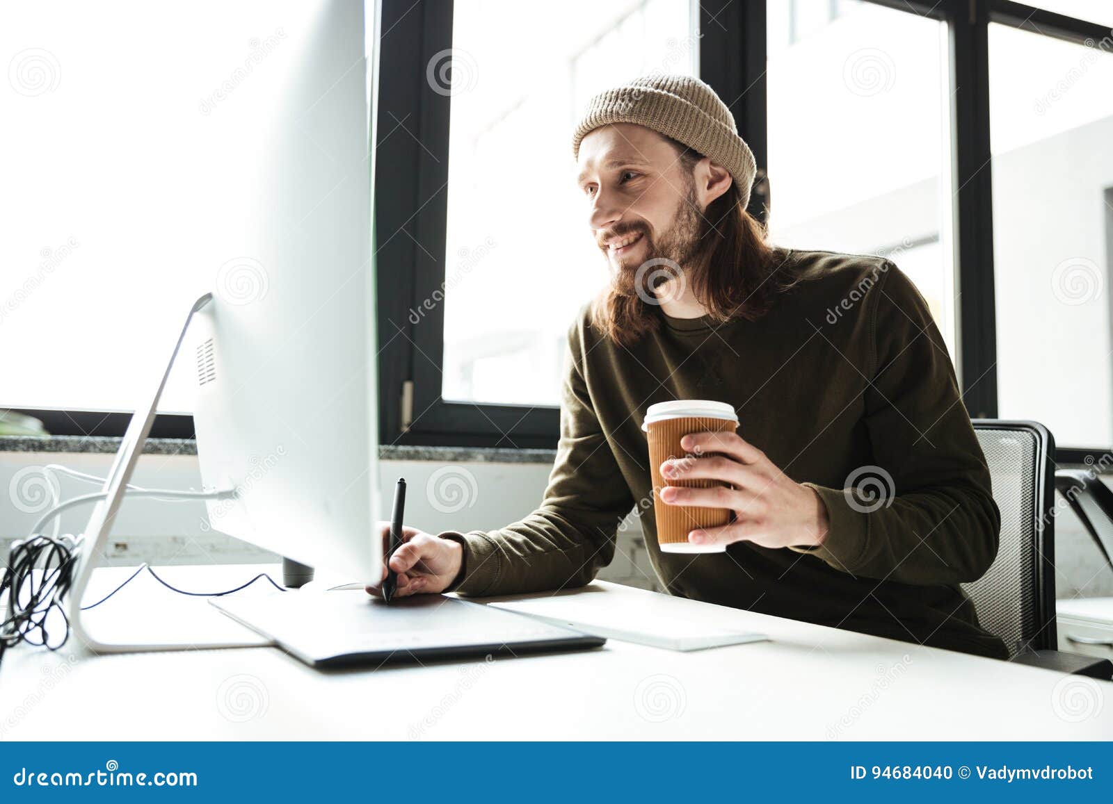 Handsome Man in Office Using Computer Stock Photo - Image of drinking ...