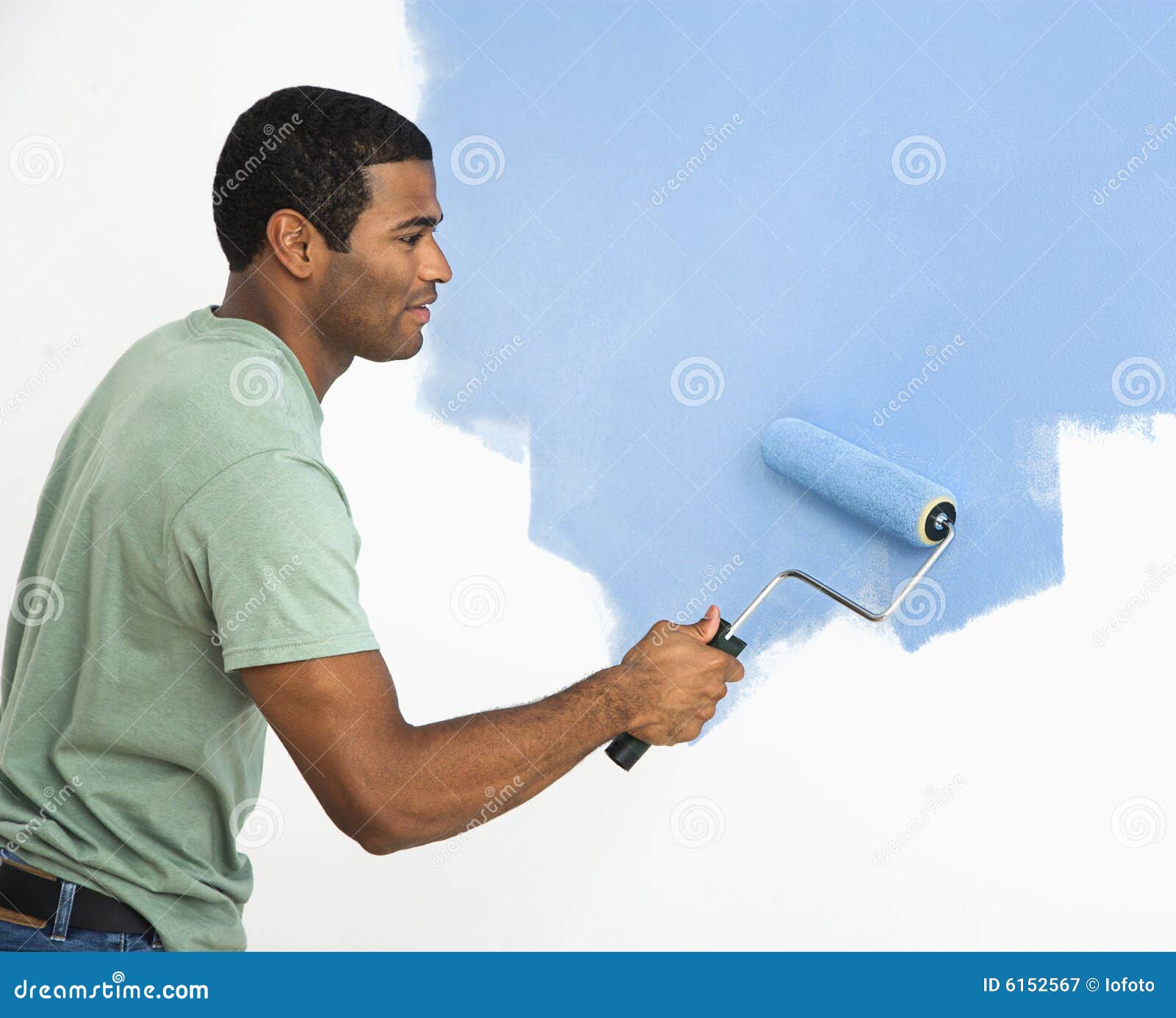 Handsome Man Painting Wall. Stock Image - Image of photograph, blue ...