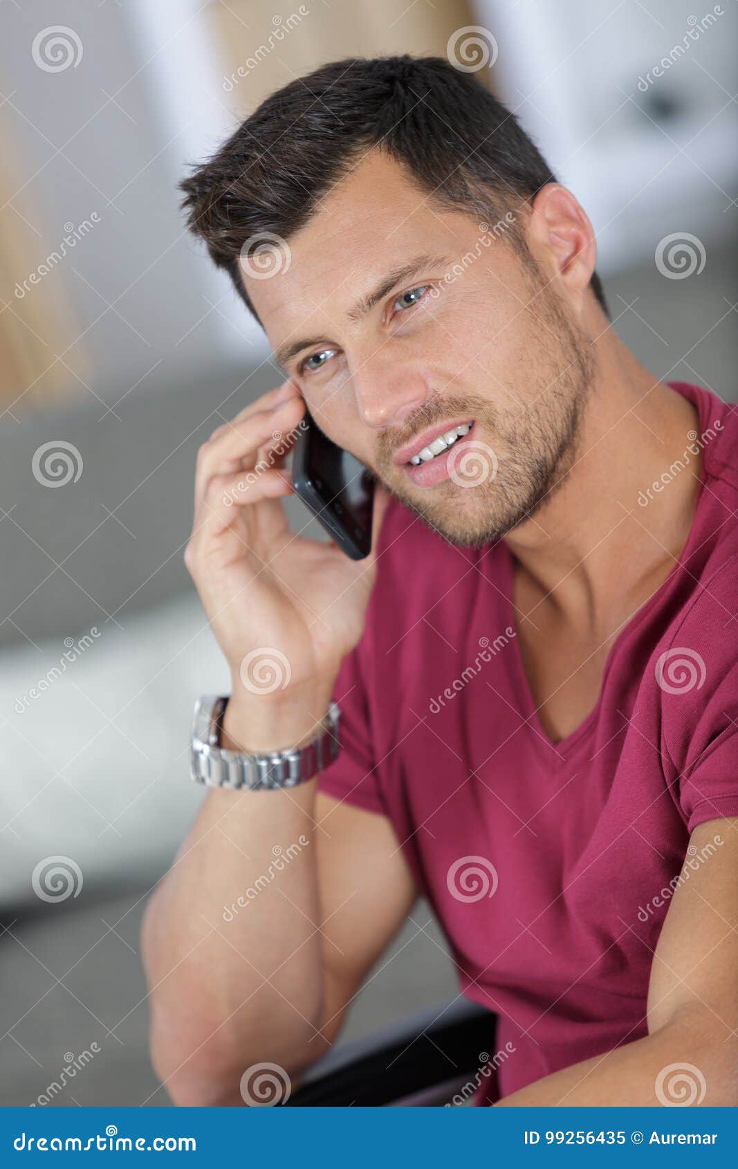 Handsome man with phone stock image. Image of portrait - 99256435