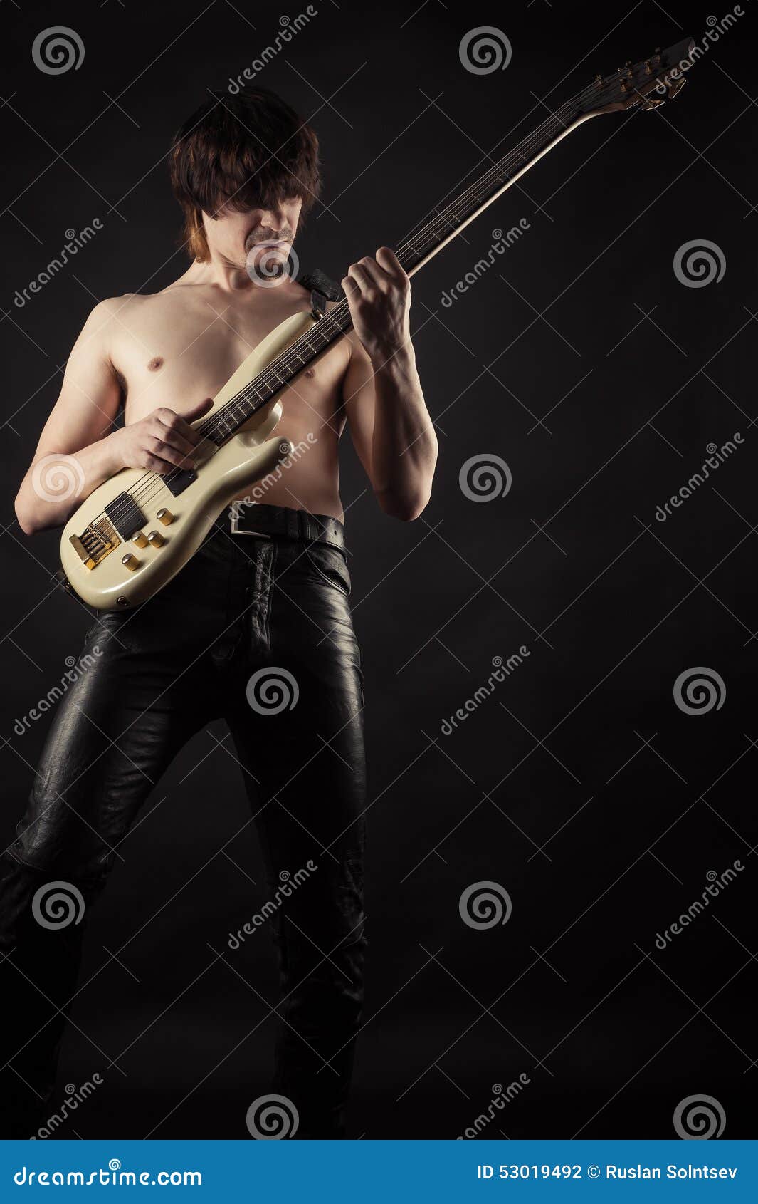 Handsome Man Playing Bass Guitar Stock Photo - Image of hairstyle ...