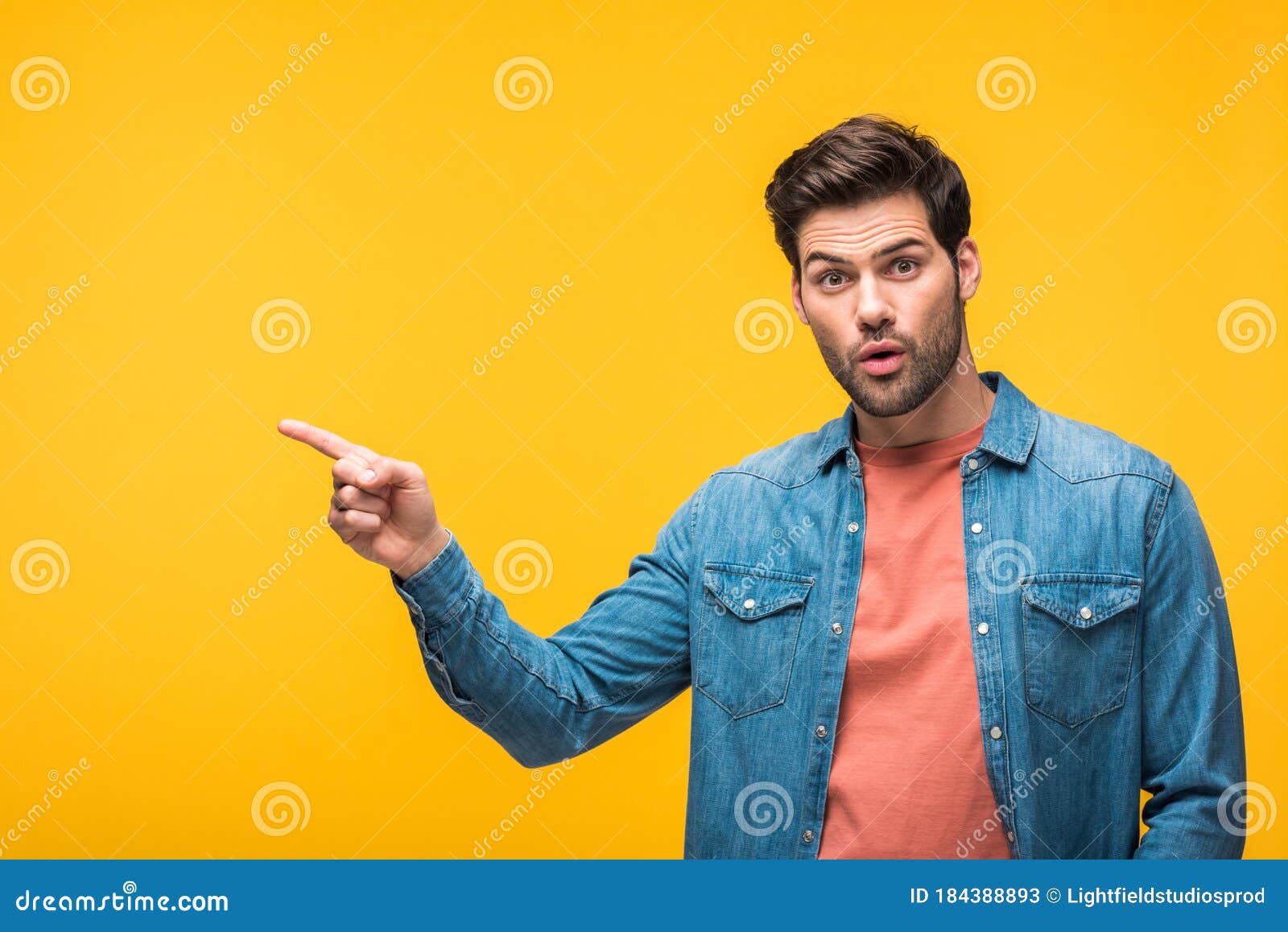 Handsome Man Pointing with Finger Isolated on Yellow Stock Image ... Handsome Man Pointing with Finger Isolated on Yellow Stock Image ...