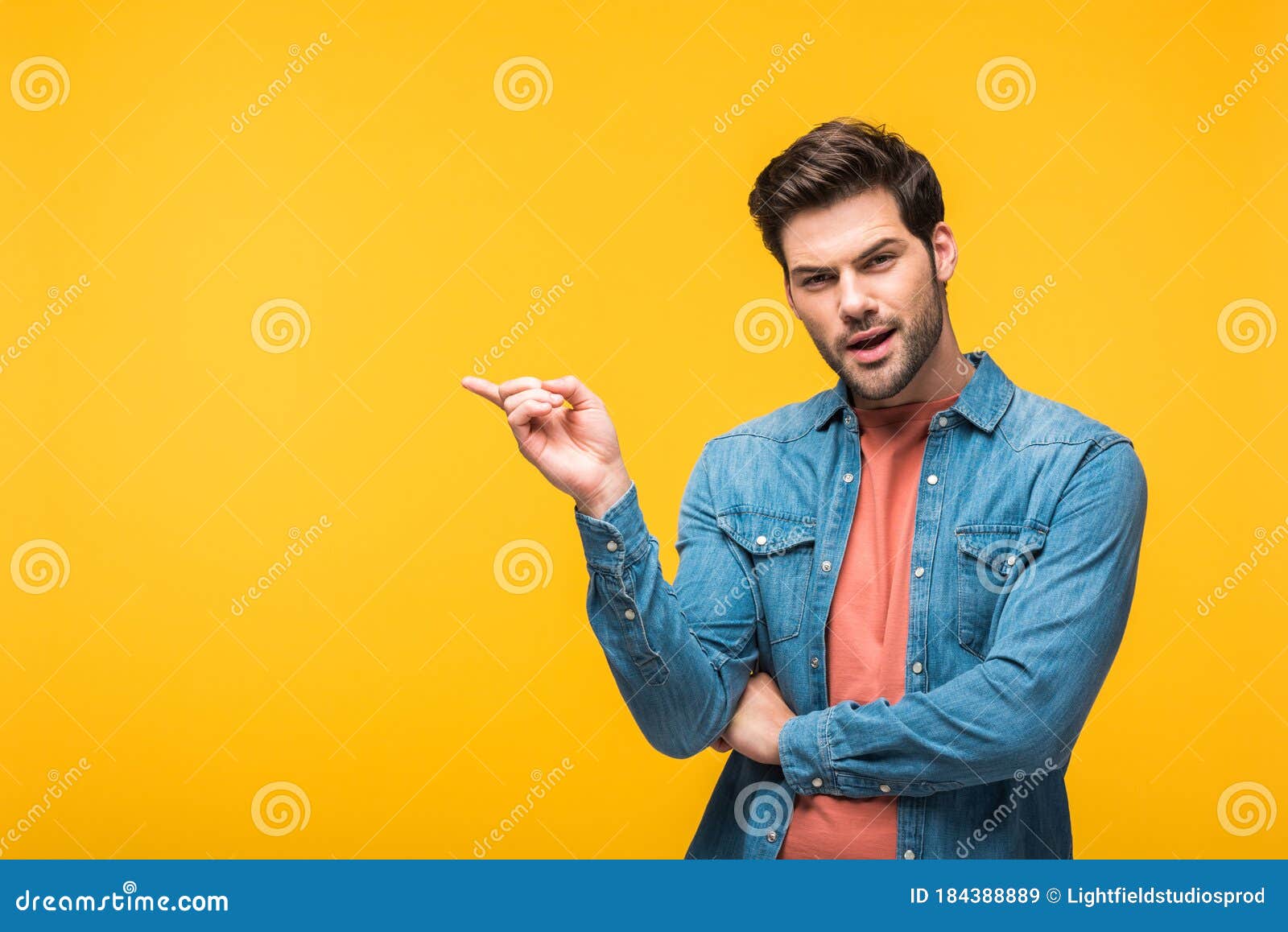 Handsome Man Pointing with Finger and Looking at Camera Isolated on ... Handsome Man Pointing with Finger and Looking at Camera Isolated on ...