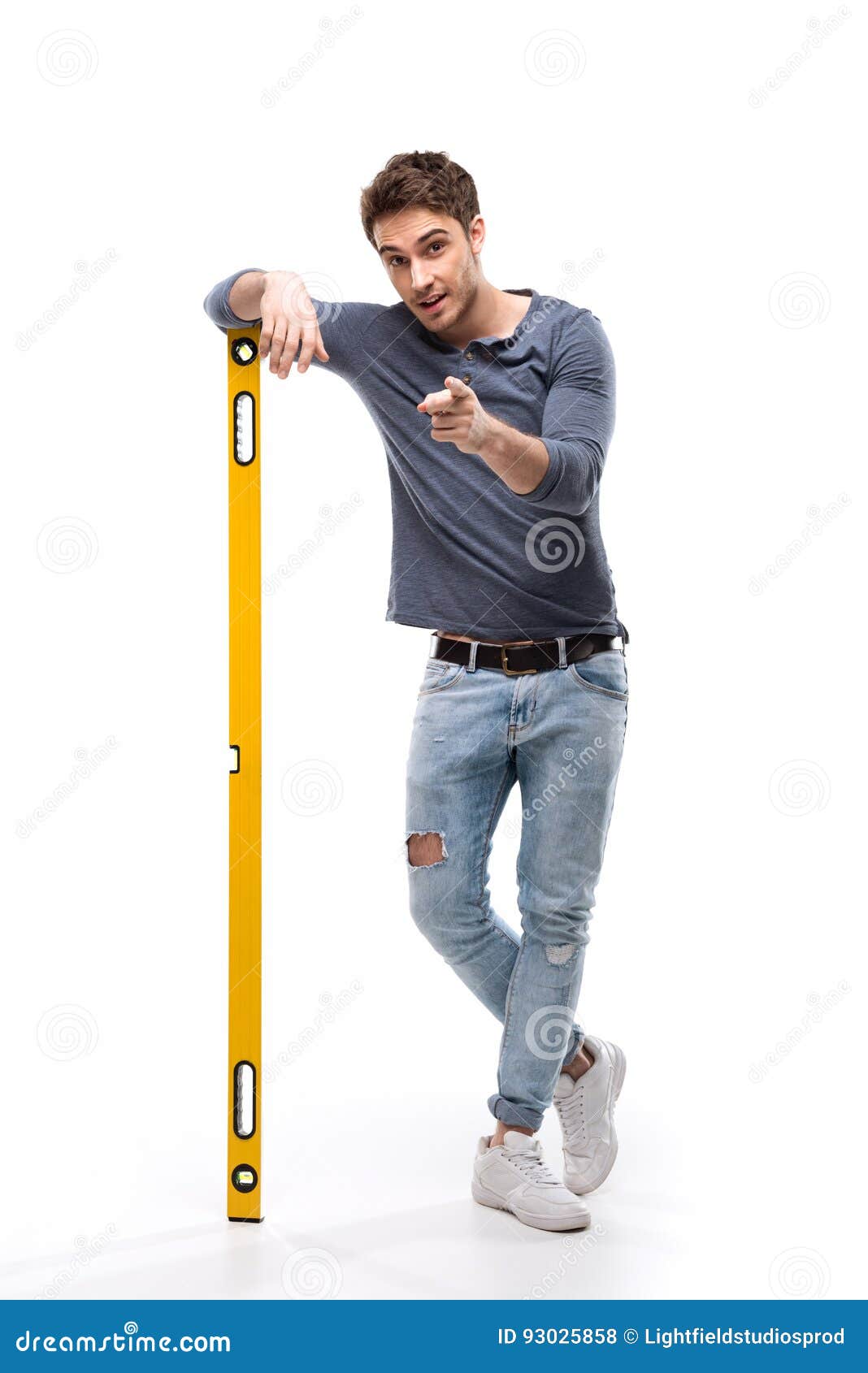 Handsome Man Pointing and Holding Building Level Isolated on White ...