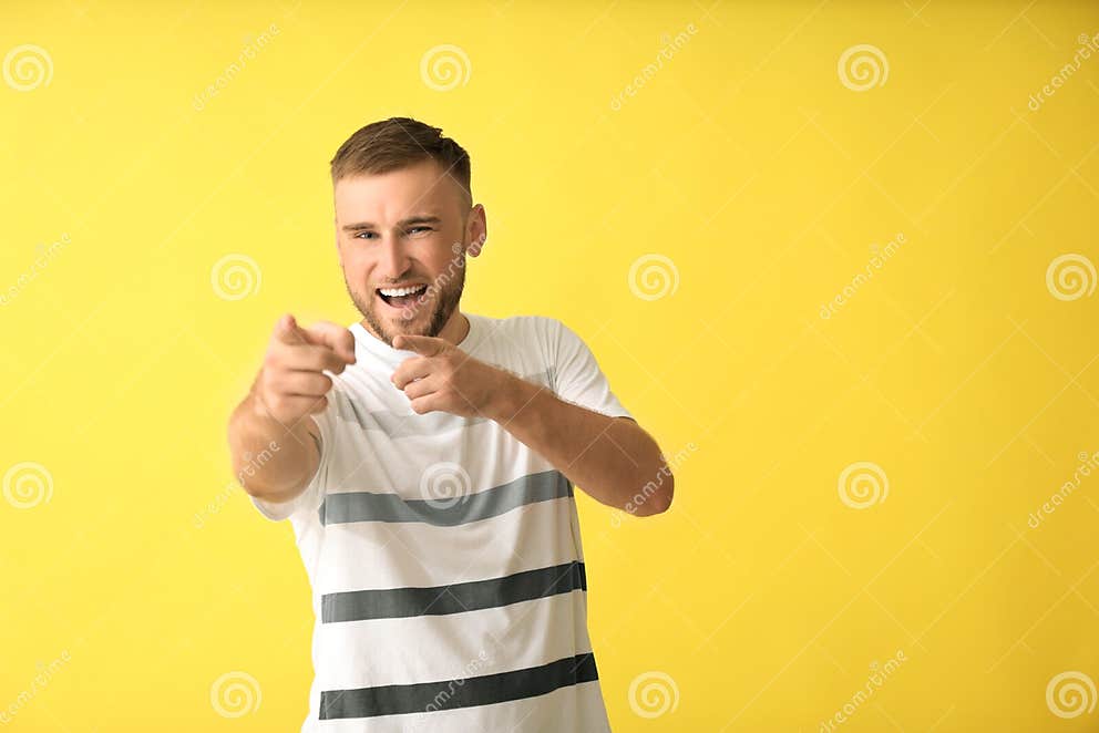 Handsome Man Pointing At Viewer On Color Background Stock Image Image