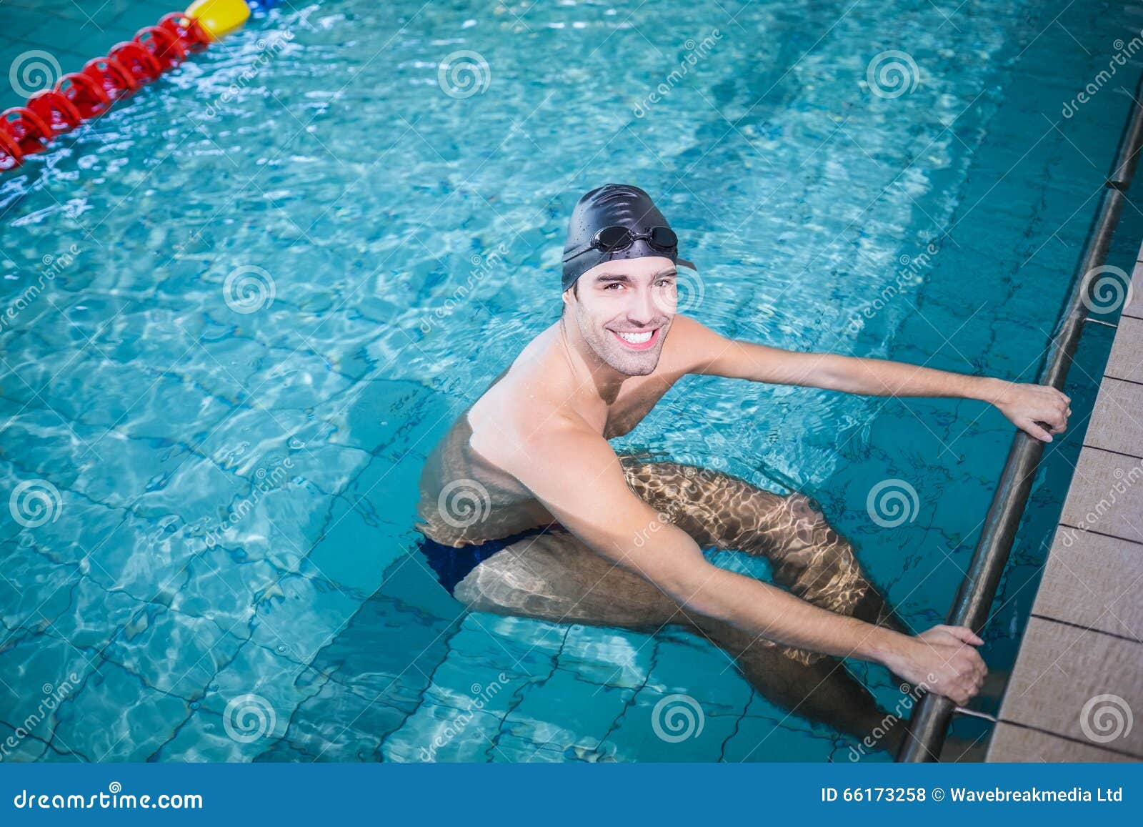 Handsome man in the pool stock photo. Image of goggle - 66173258