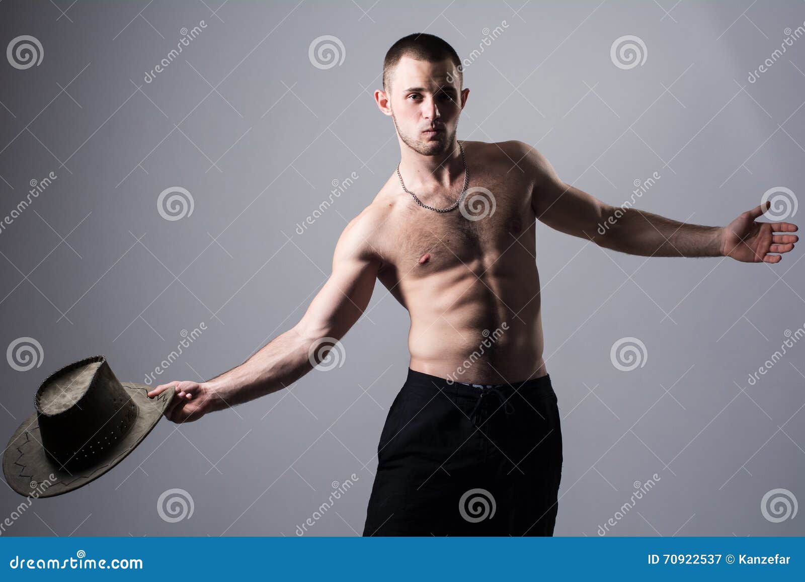 Handsome Man Posing with a Cowboy Hat Stock Image - Image of abdominal ...