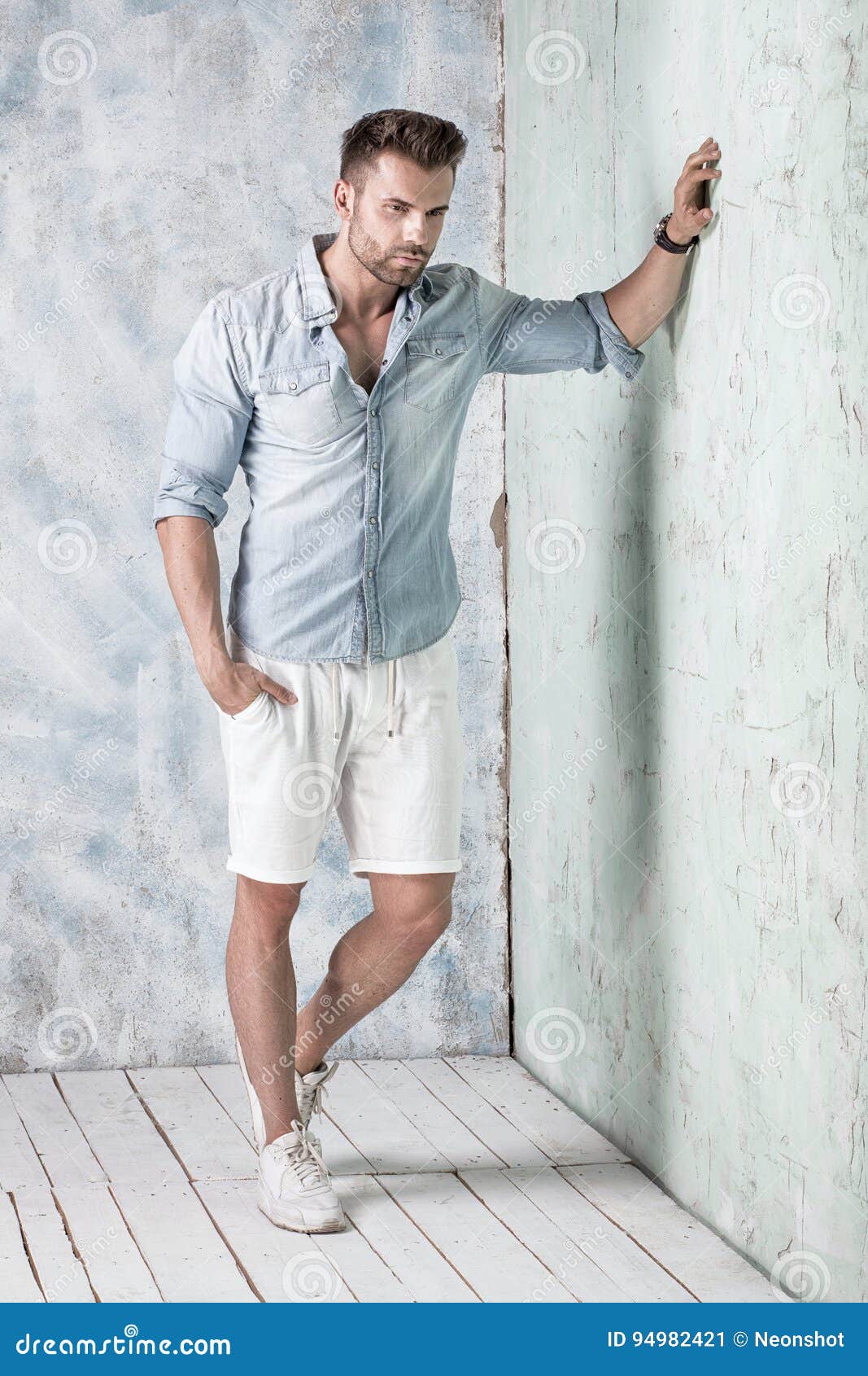 Handsome Man Posing in Studio. Stock Image - Image of model, long: 94982421
