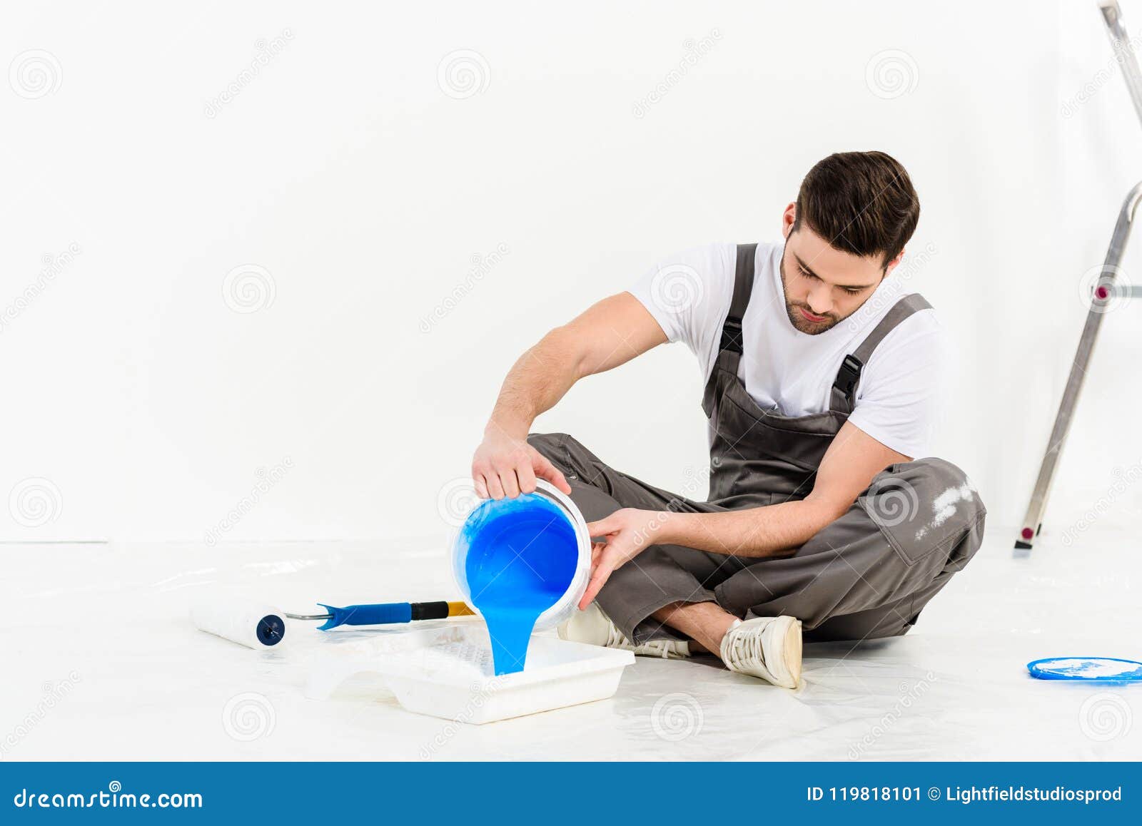 Handsome man pouring paint stock image. Image of caucasian - 119818101
