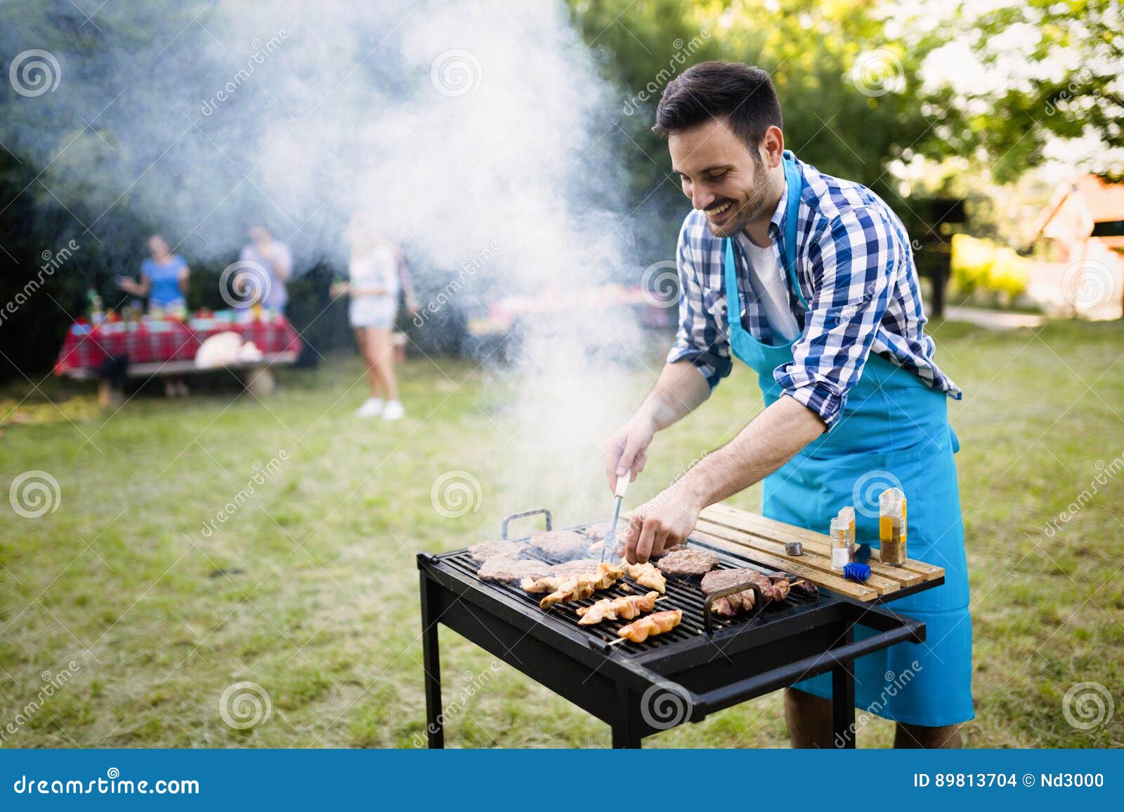 Handsome Man Preparing Barbecue Stock Photo - Image of grilled, eating ...