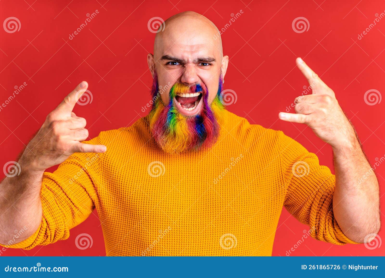 Handsome Man with Raindow in Beard and Yellow Sweater in Red Studio ...