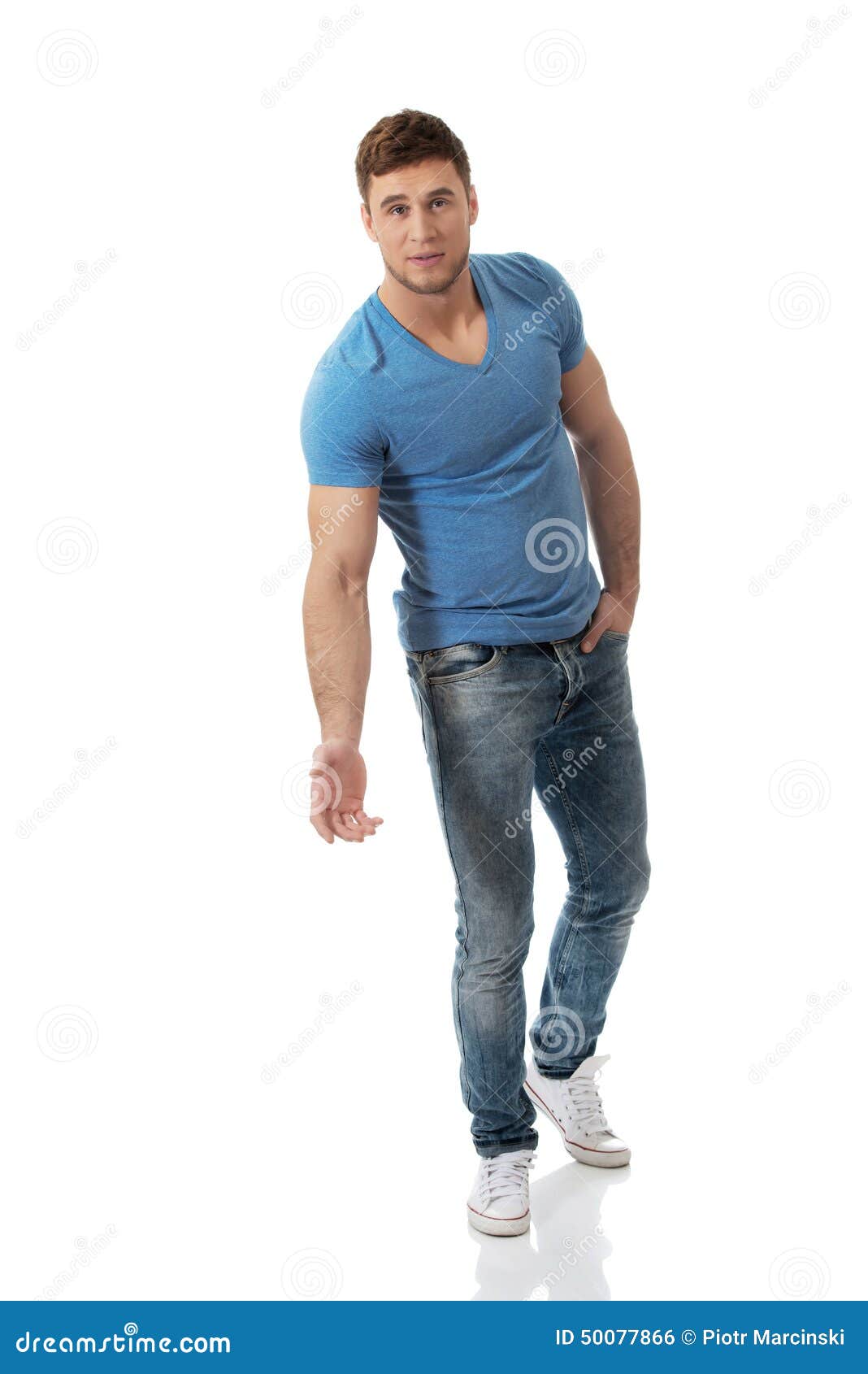 Handsome Man Reaching for Something on the Floor. Stock Photo - Image ...