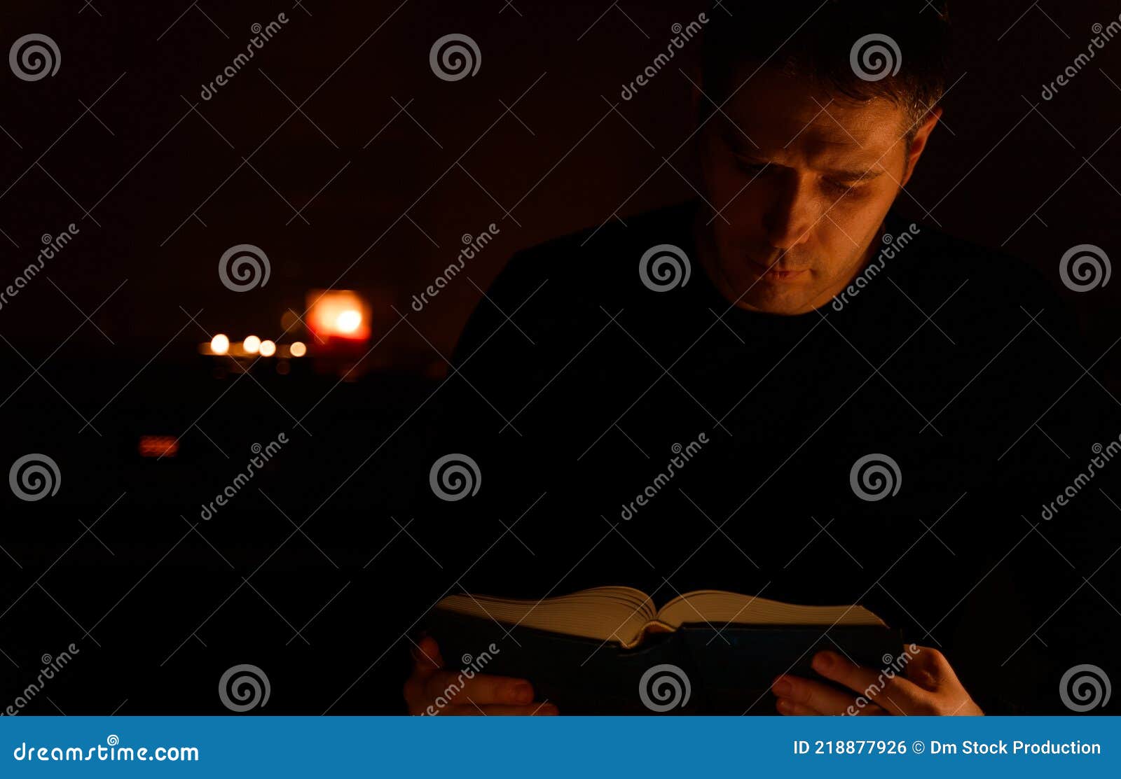Handsome man reading book stock photo. Image of learning - 218877926