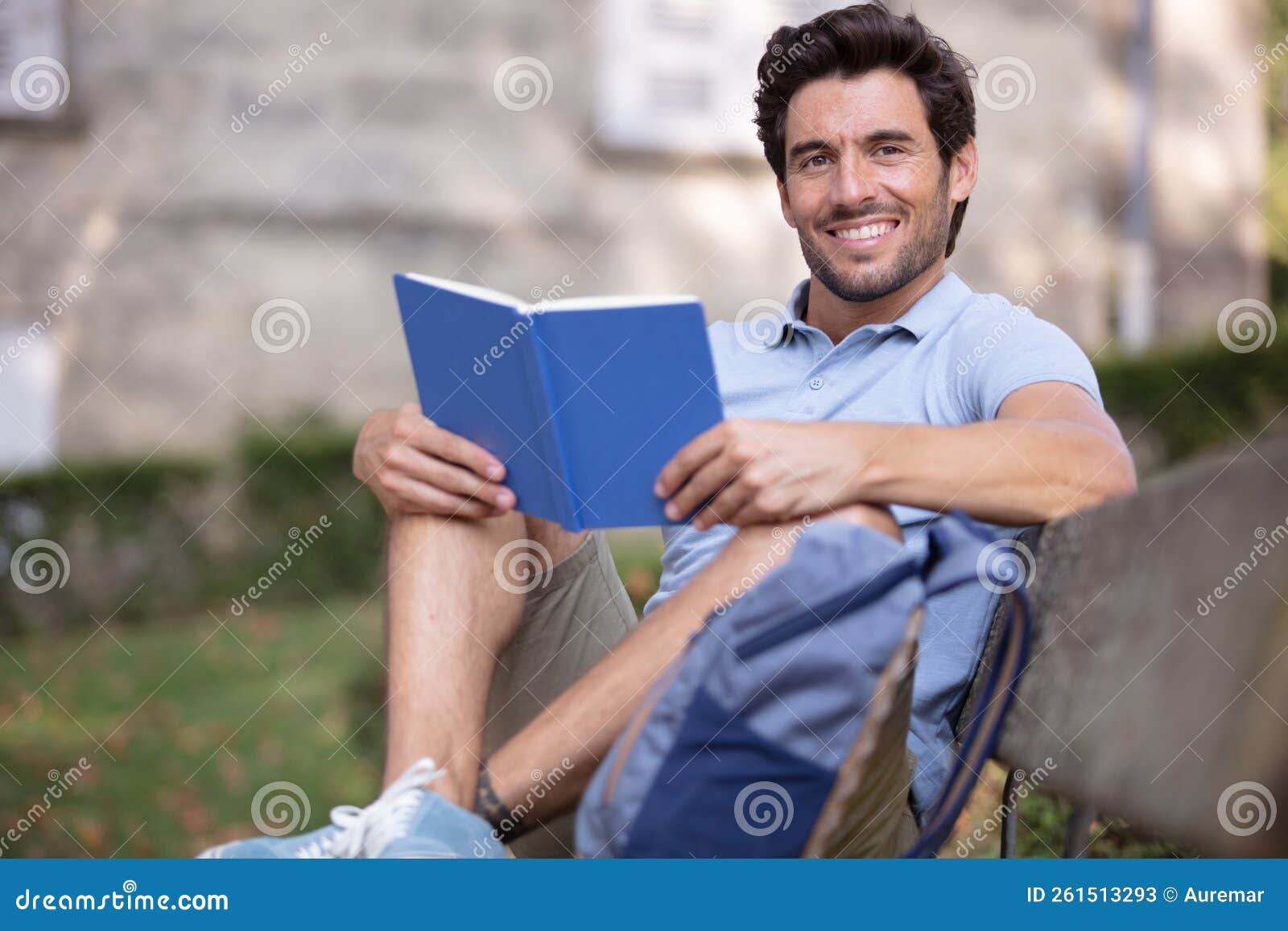 Handsome Man Reading Book Outdoors Stock Image - Image of ...