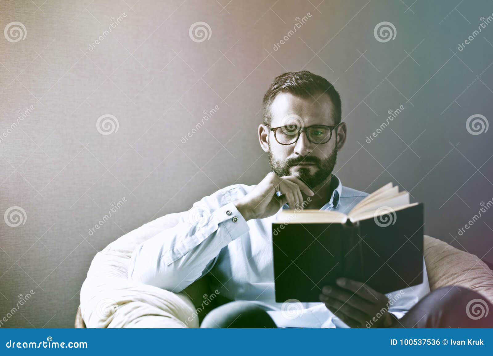 Man Reading Interesting Book Stock Photo - Image of studying, interest ...