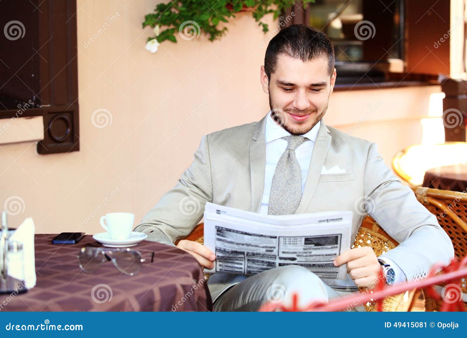 Handsome Man Reading Newspaper Stock Image - Image of business, outdoor ...