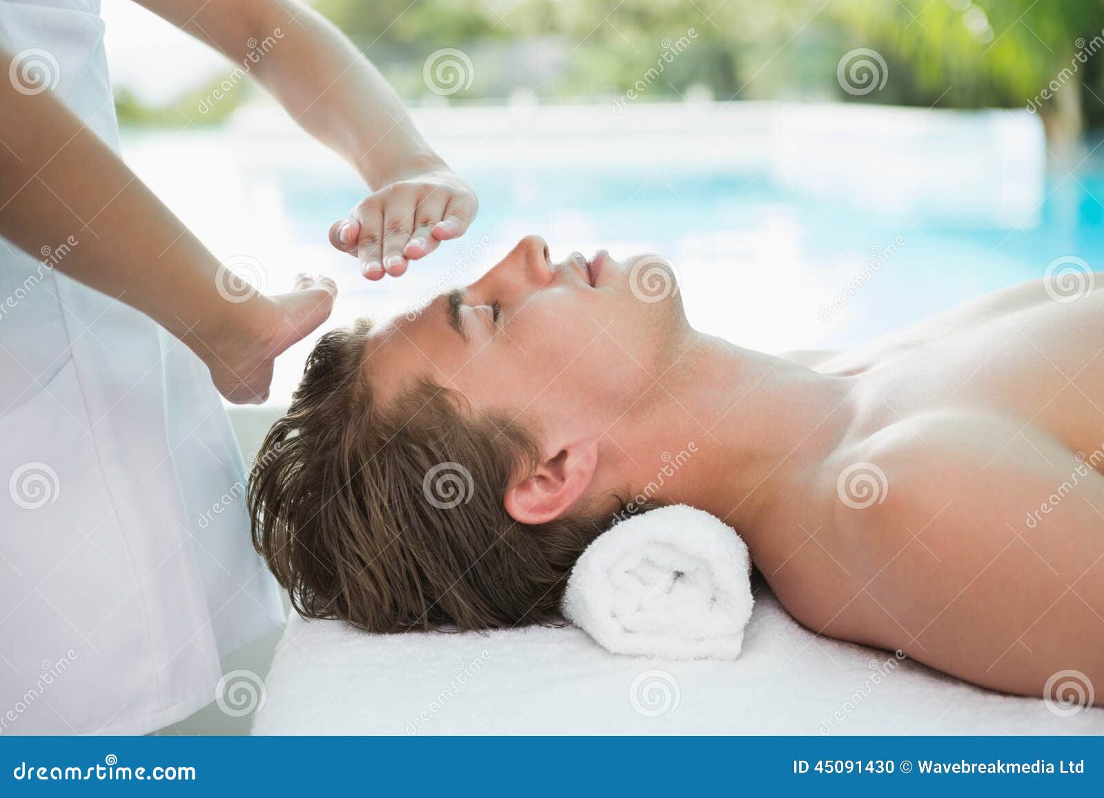Handsome Man Receiving Treatment at Spa Center Stock Photo - Image of ...