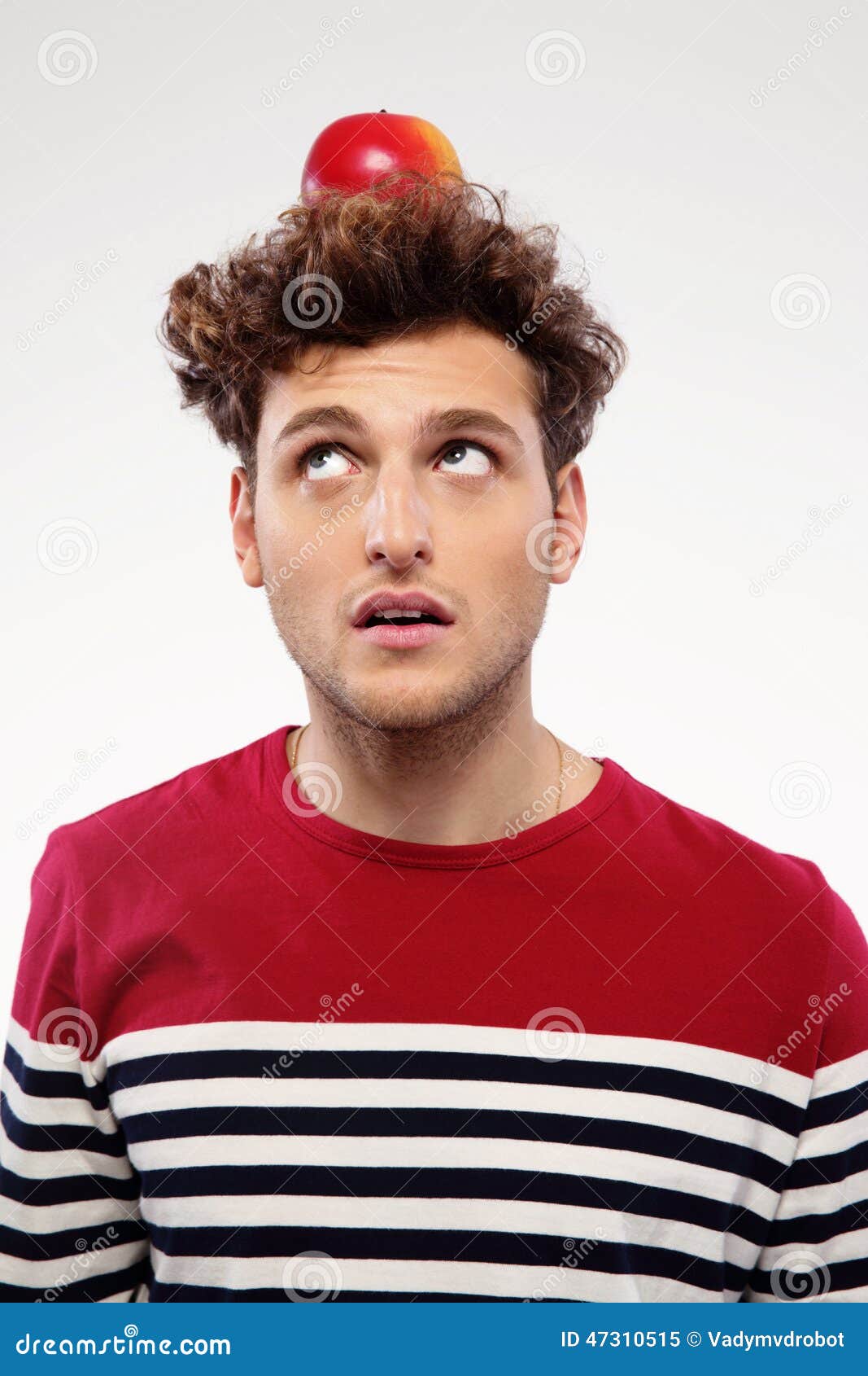 Handsome Man with Red Apple on the Head Stock Image - Image of looking ...