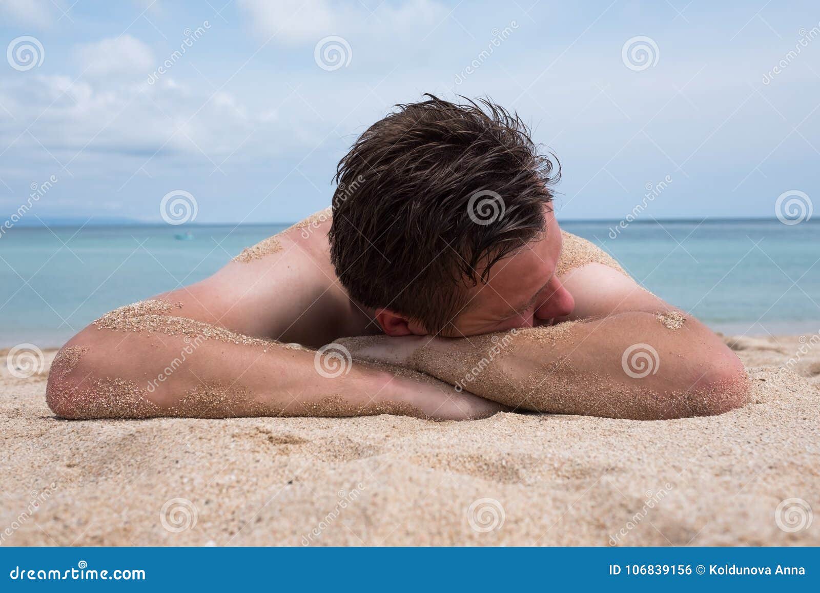 Handsome Man Relaxing on the Beach Lying and Sleeping Stock Photo ...