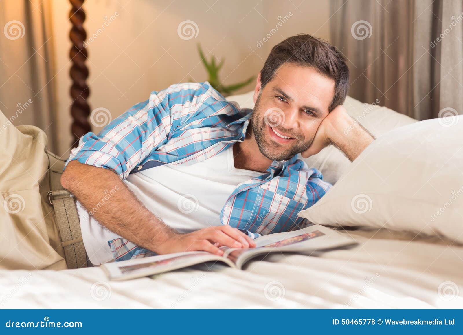 Handsome Man Relaxing on His Bed Stock Photo - Image of home, adult ...