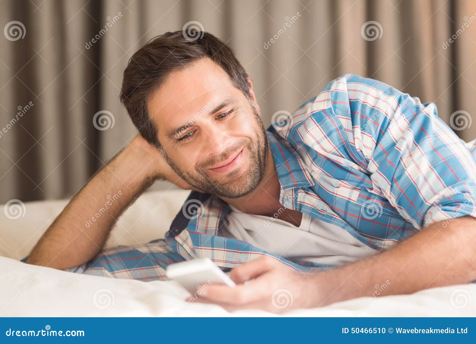 Handsome Man Relaxing on His Bed Stock Photo - Image of house ...
