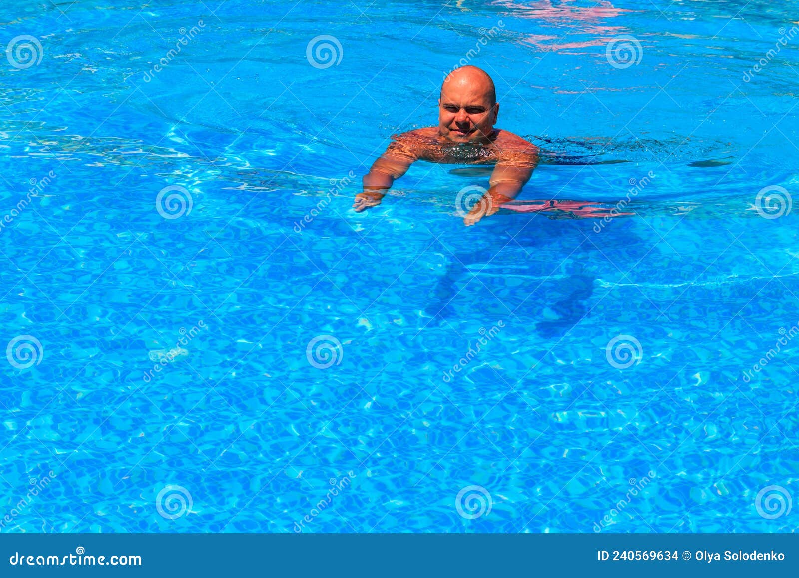 Handsome Man Relaxing in Swimming Pool Stock Photo - Image of resting ...