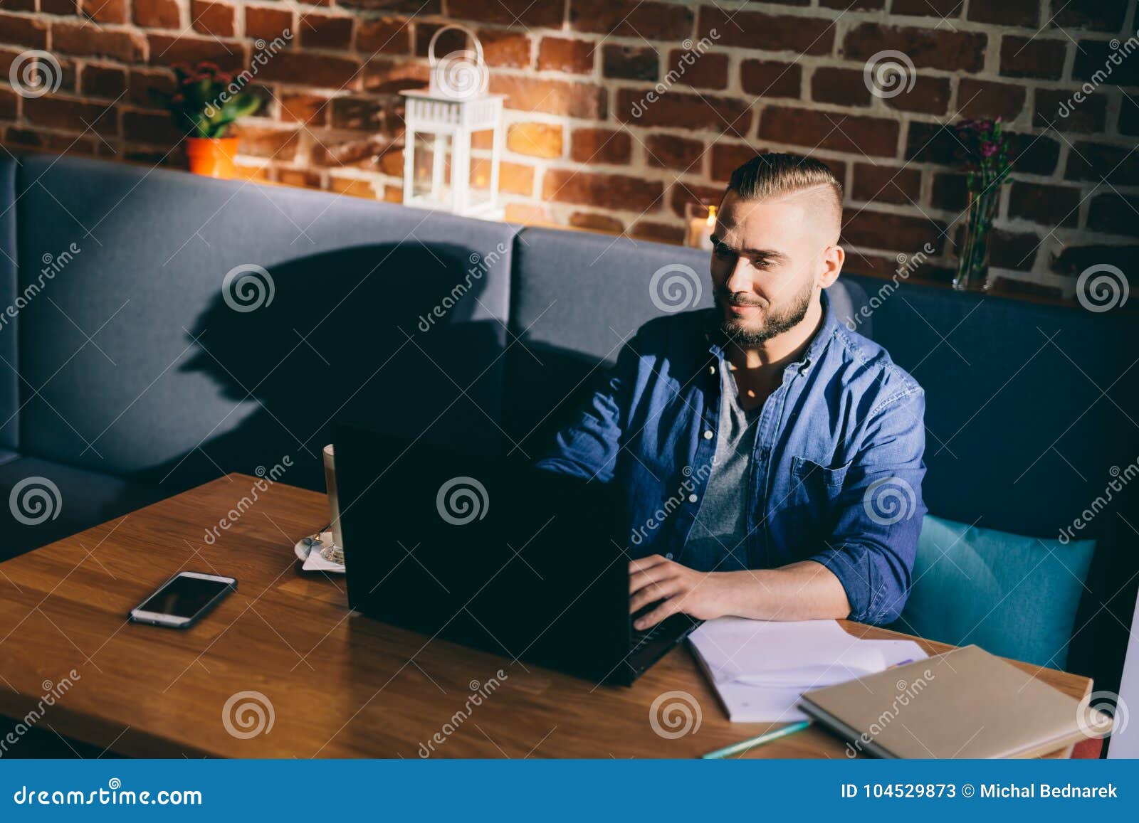 Handsome Man Doing Paperwork in a Restaurant Stock Image - Image of ...