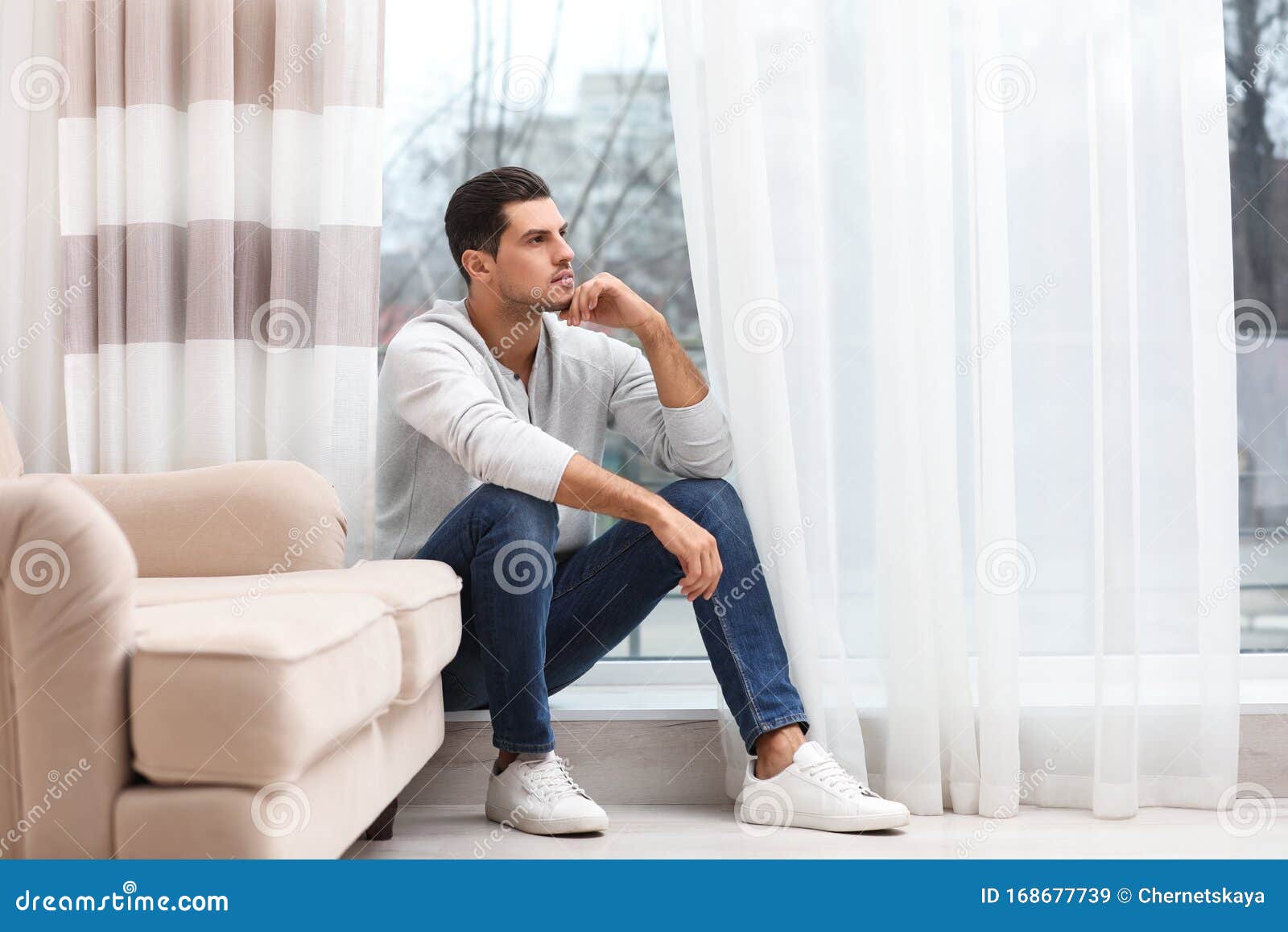 Handsome Man Resting Near Window Stock Image - Image of comfort ...