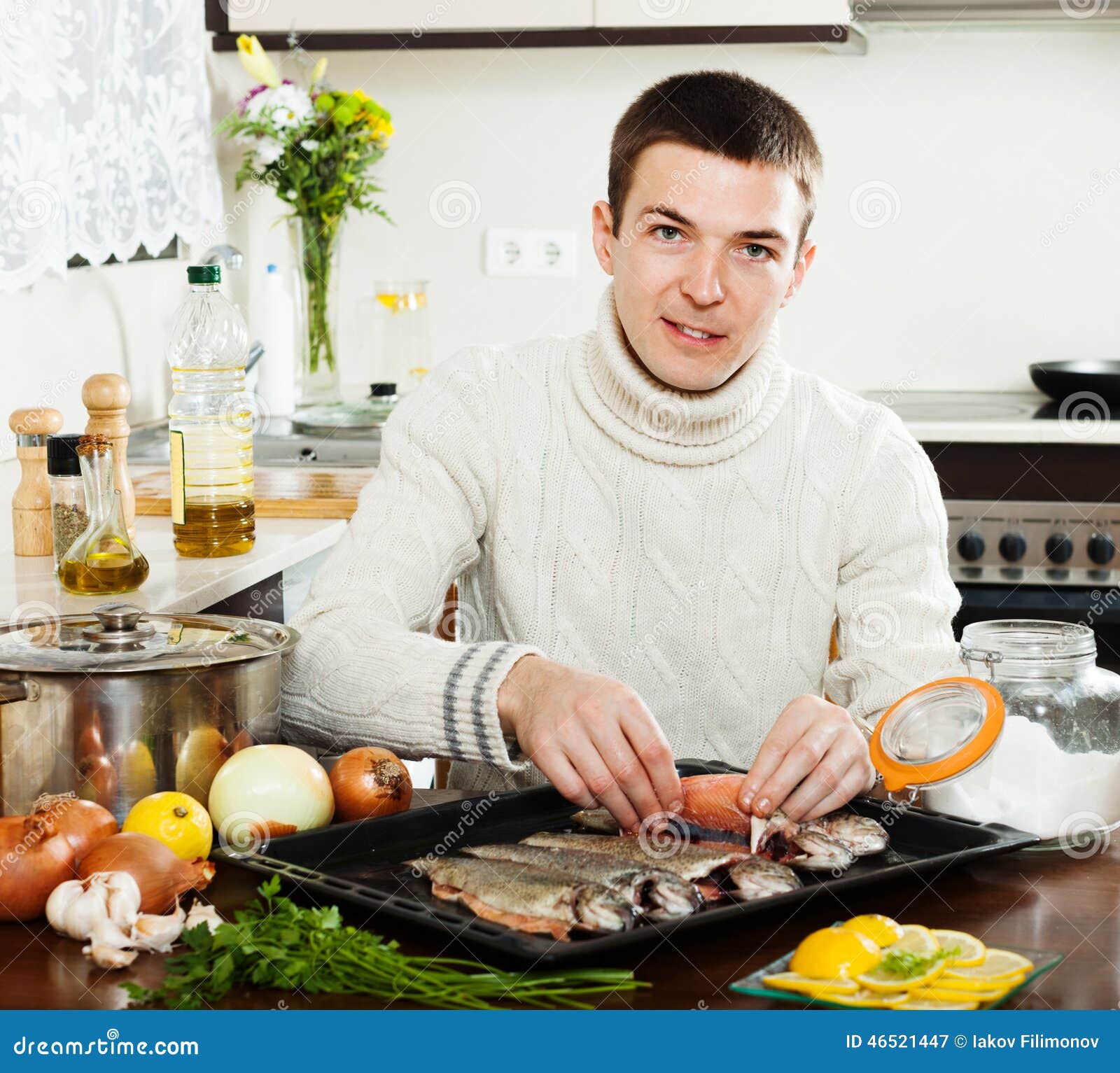 Handsome Man Salting Fish on Baking Sheet Stock Image - Image of frypan ...