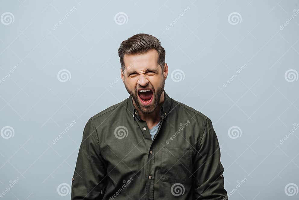 Handsome Man Screaming at Camera Stock Photo - Image of bearded, scream ...