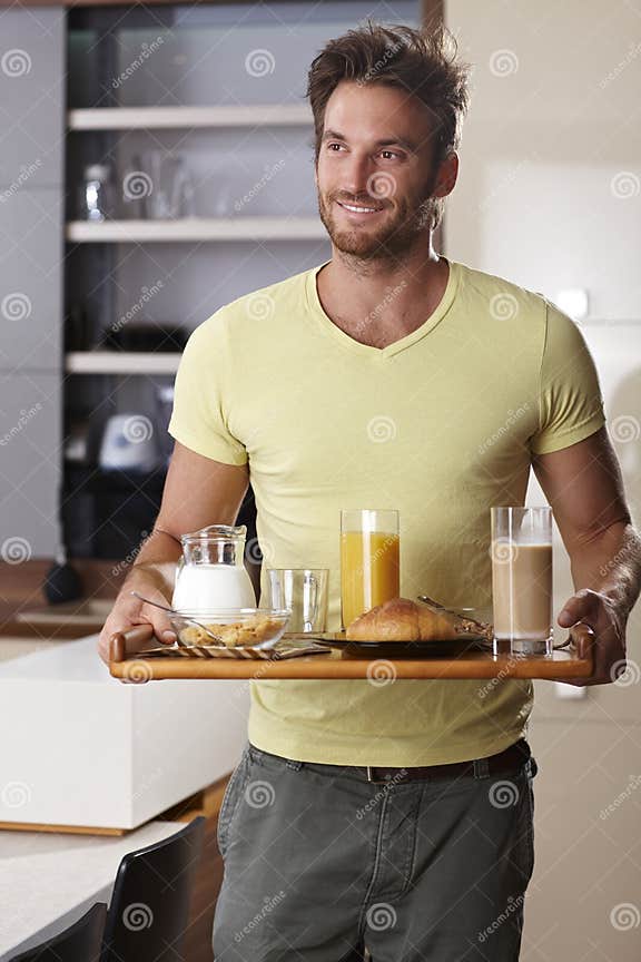 Handsome Man Serving Breakfast for Two Stock Photo - Image of face ...