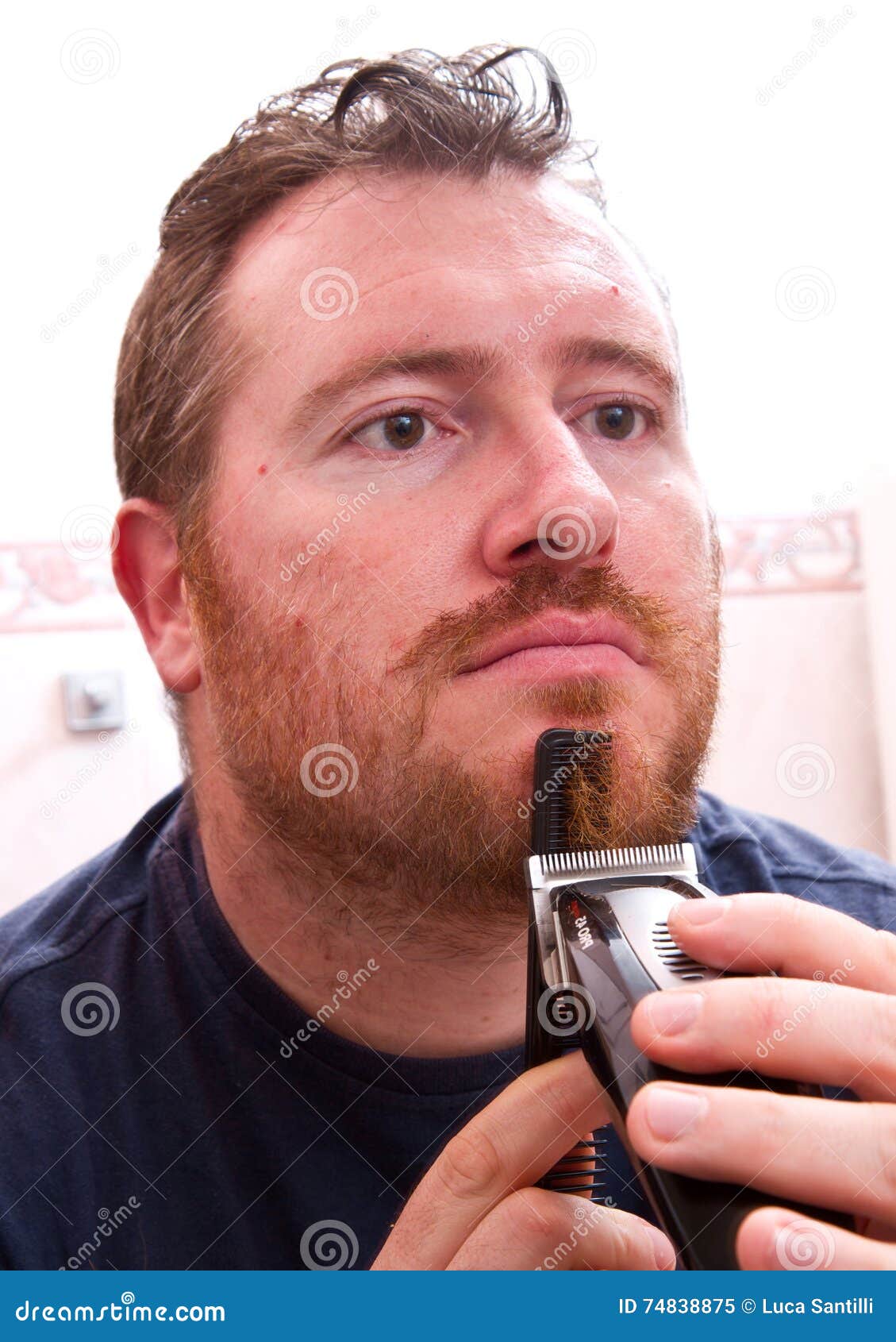 An Handsome Man Shaving Face with Electric Razor Stock Image - Image of ...