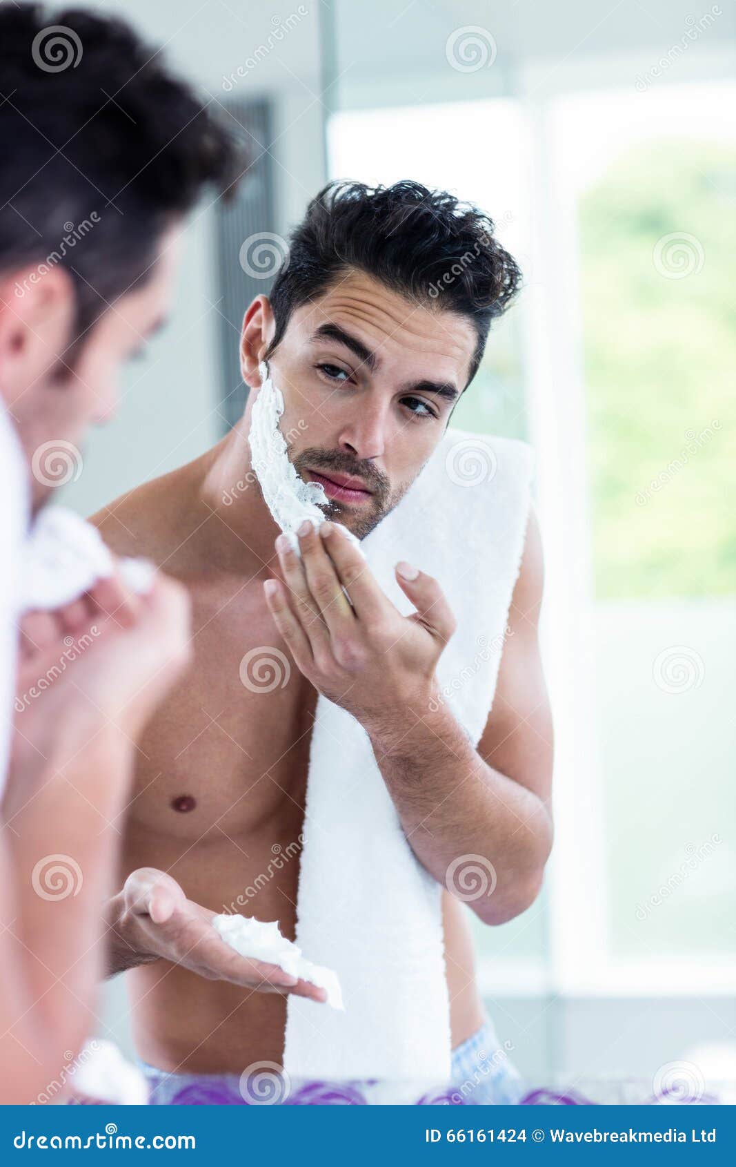 Handsome Man Shaving His Beard Stock Photo - Image of hair, adult: 66161424
