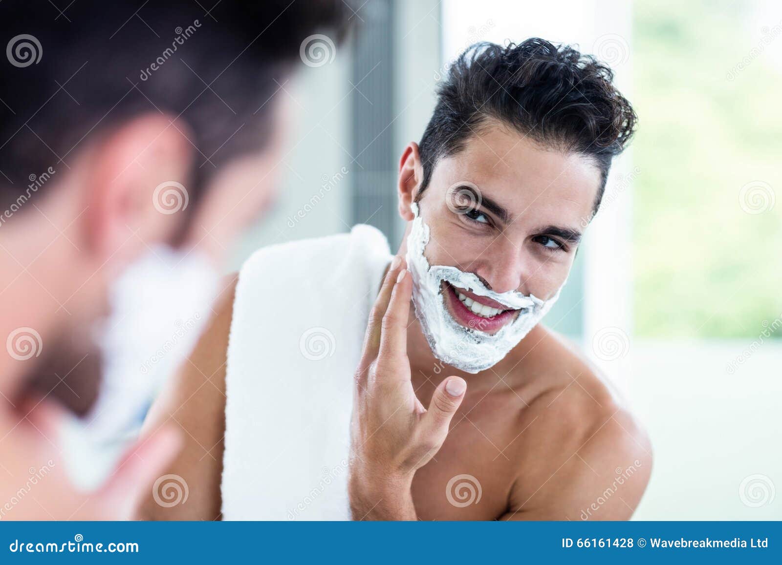 Handsome Man Shaving His Beard Stock Photo - Image of care, male: 66161428