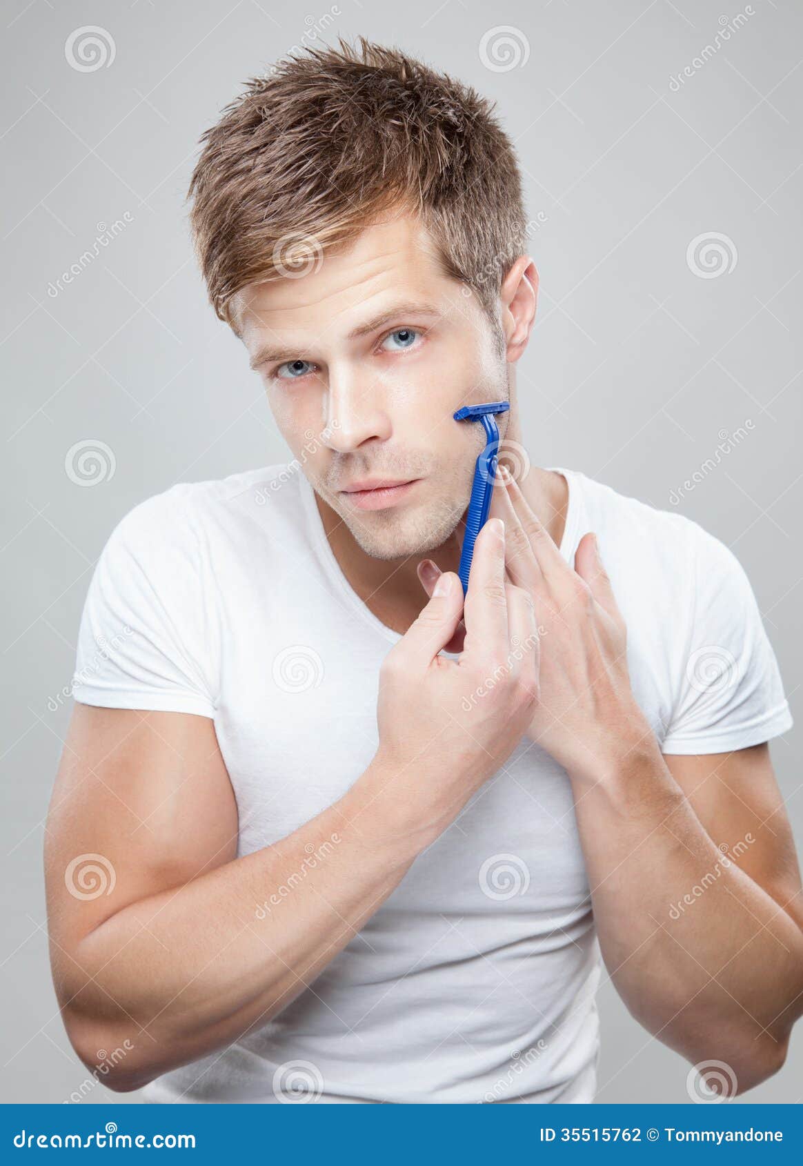 Handsome man shaving stock photo. Image of face, hair - 35515762