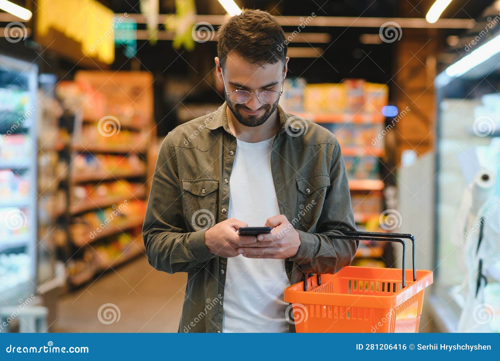 Handsome Man Shopping in a Supermarket Stock Photo - Image of shopping ...