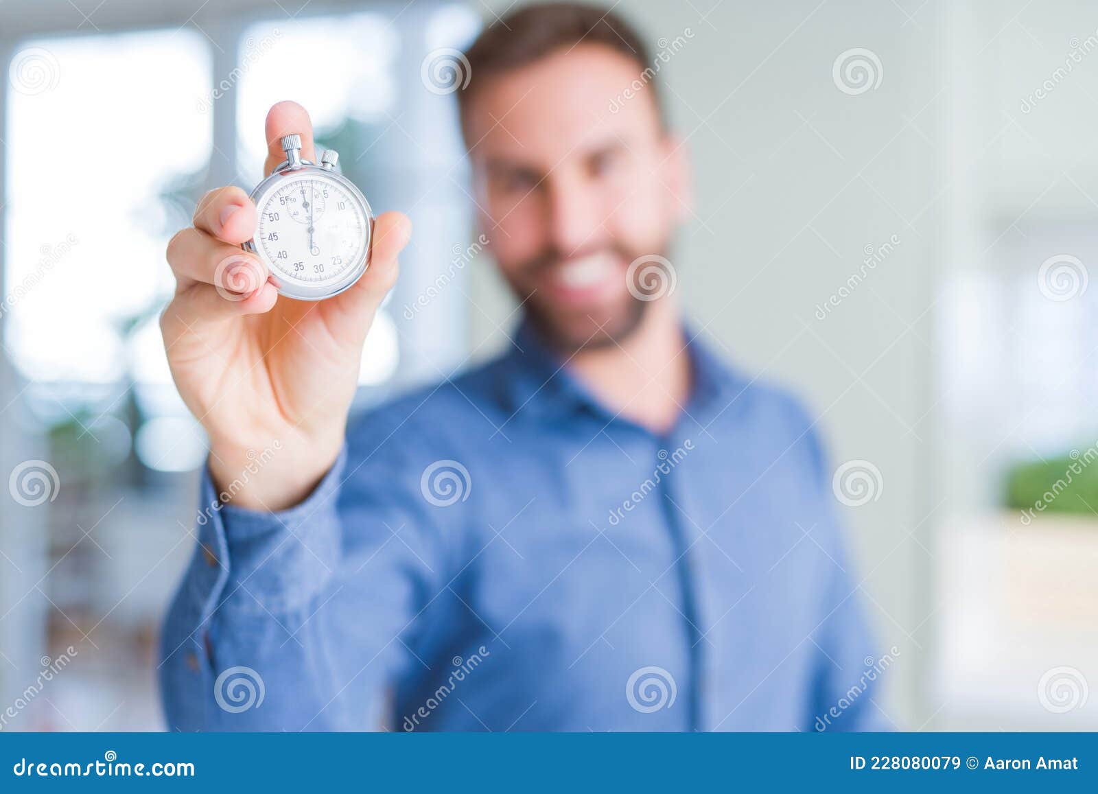 Handsome Man Showing Stopwatch Stock Image - Image of handsome, casual ...
