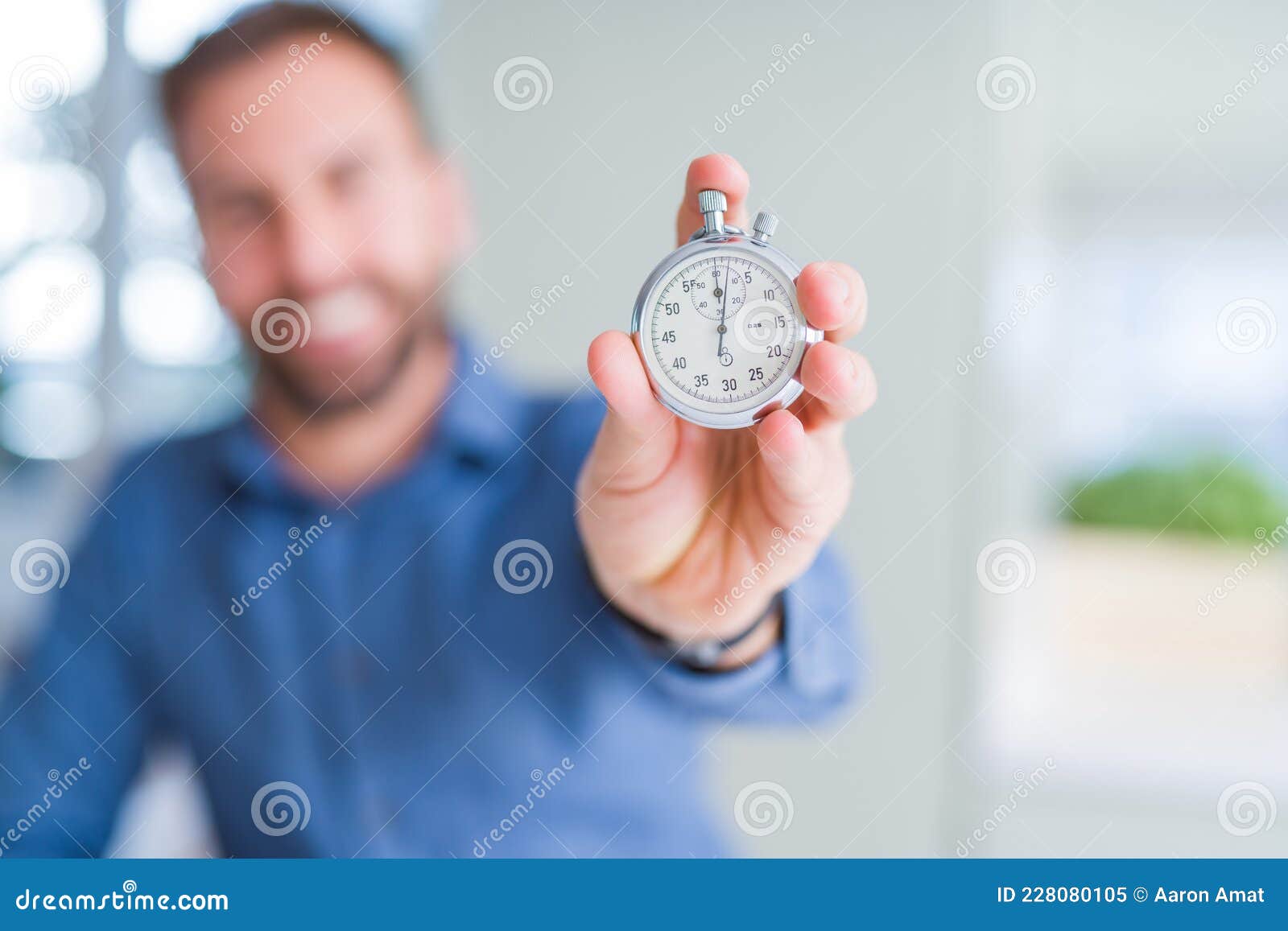 Handsome Man Showing Stopwatch Stock Image - Image of beard, hold ...