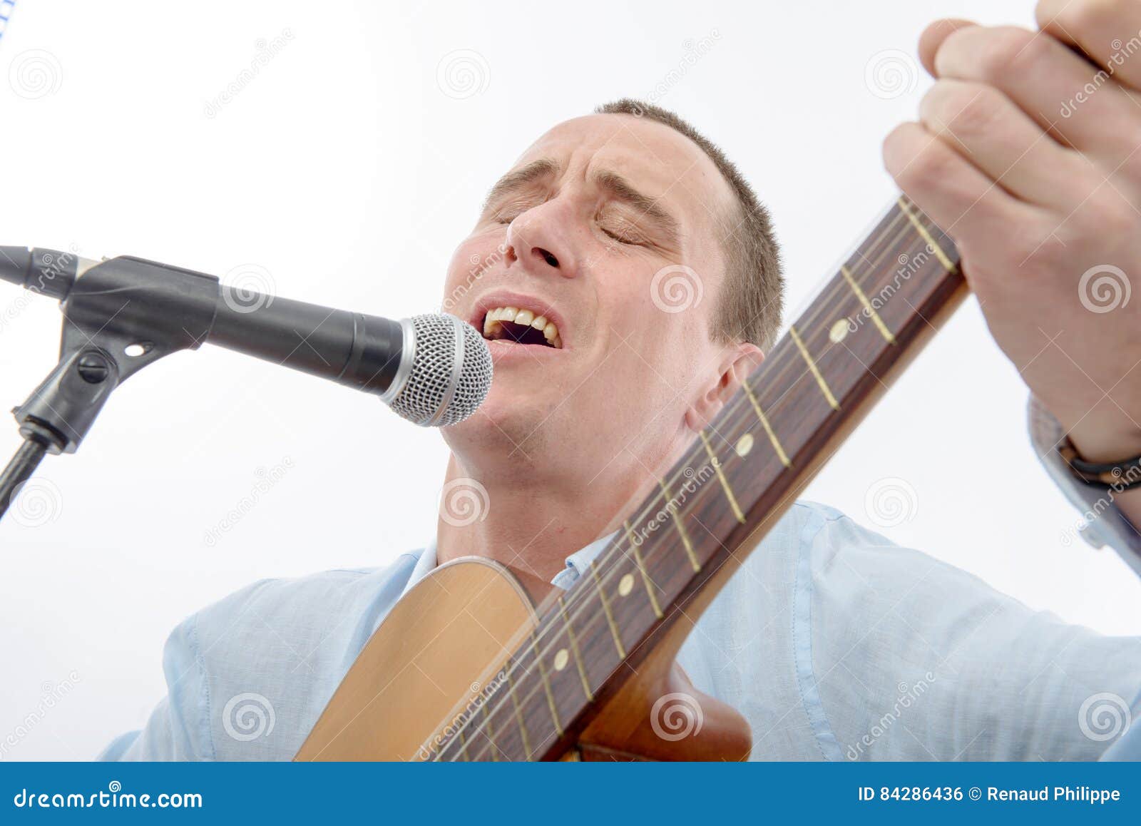 Handsome man singing stock photo. Image of person, microphone - 84286436