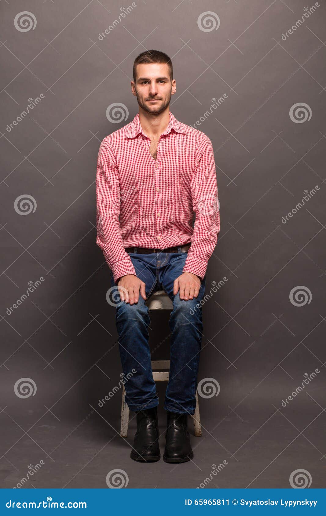 Handsome Man Sitting on a Chair in Studio Stock Image - Image of studio ...