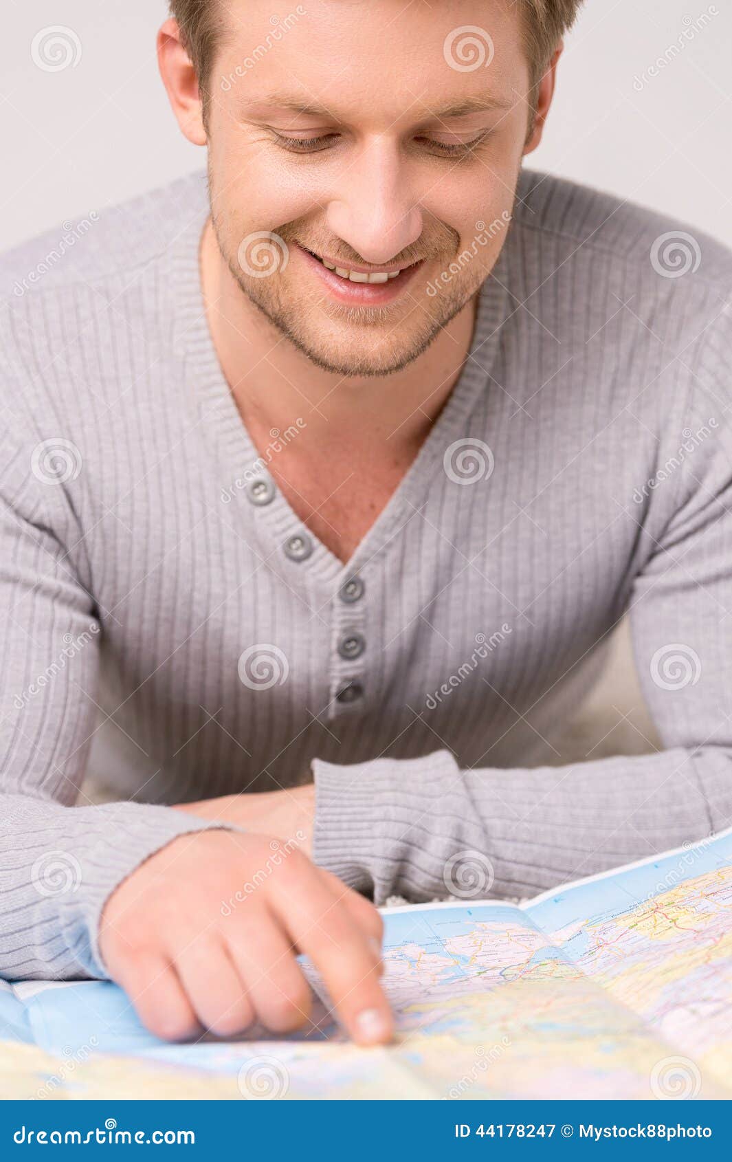 Handsome Man Sitting and Looking at Map. Stock Image - Image of hand ...
