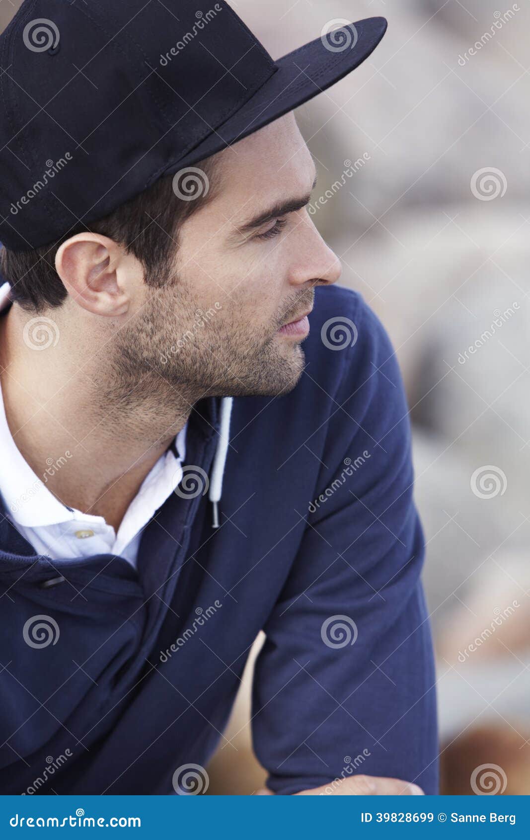 Handsome Man Sitting Outdoors Stock Image - Image of looking, lifestyle ...