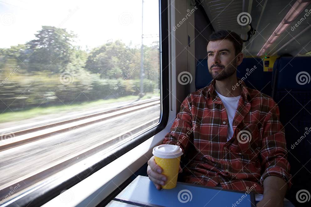 Handsome Man Sitting on Train Stock Image - Image of white, commuter ...