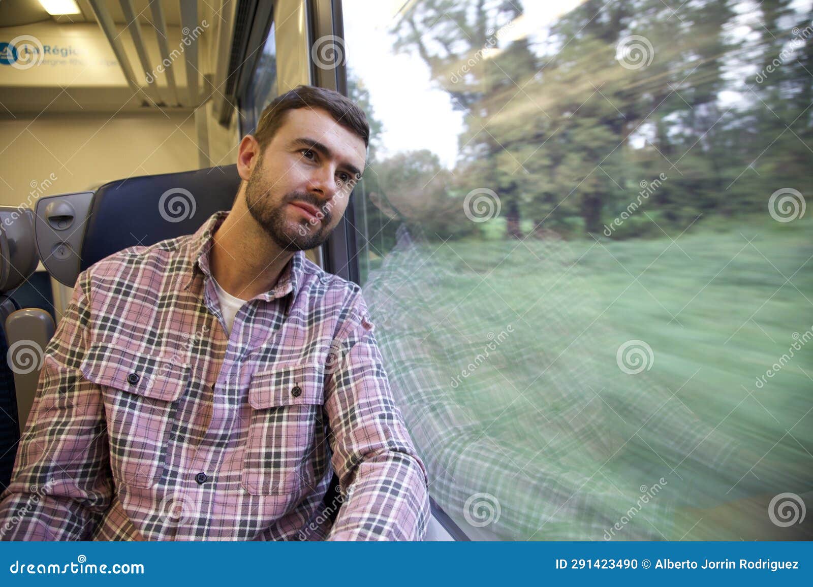 Handsome Man Sitting on Train Stock Photo - Image of introspective ...