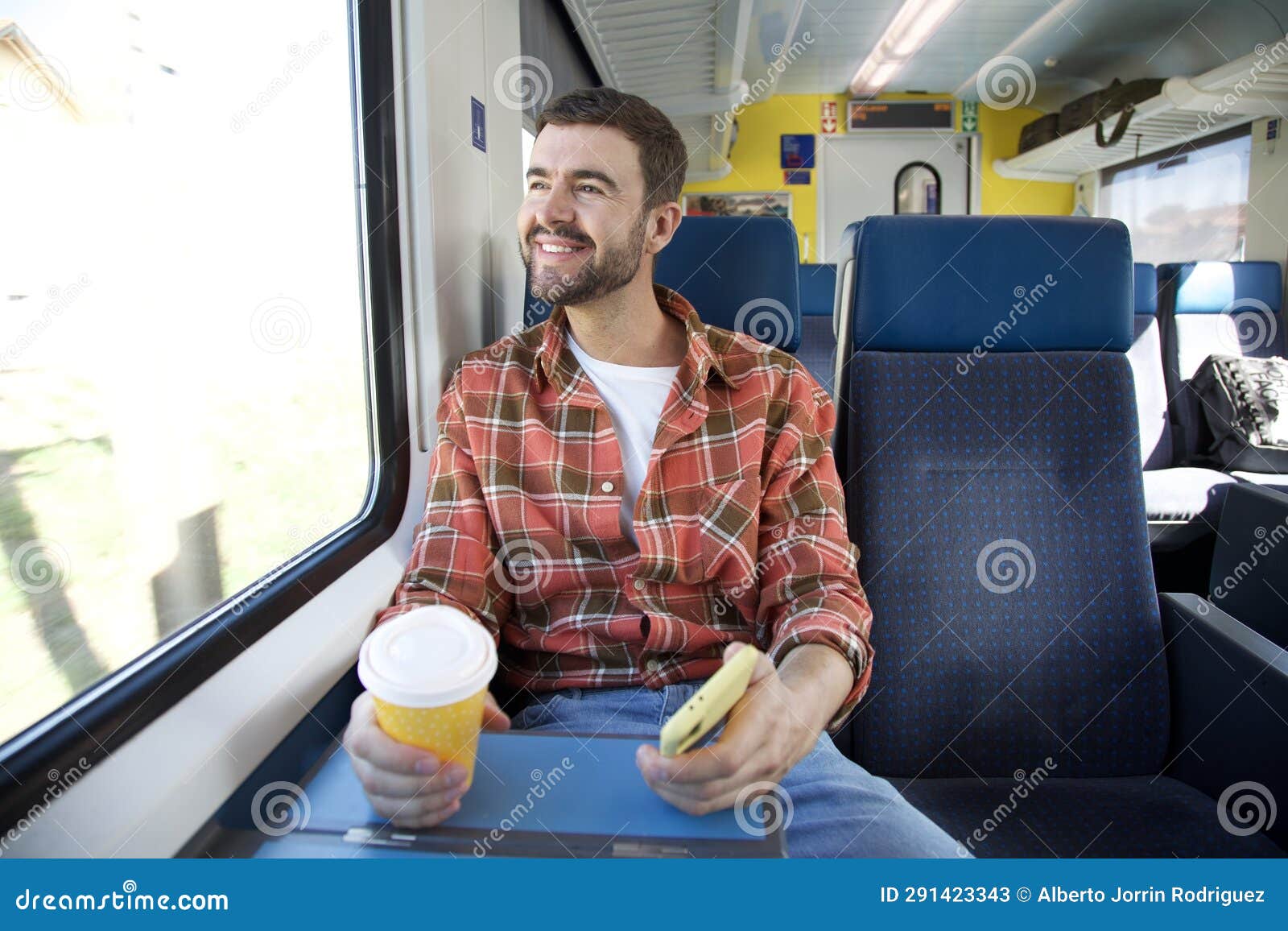Handsome Man Sitting on Train Stock Image - Image of symbol, real ...